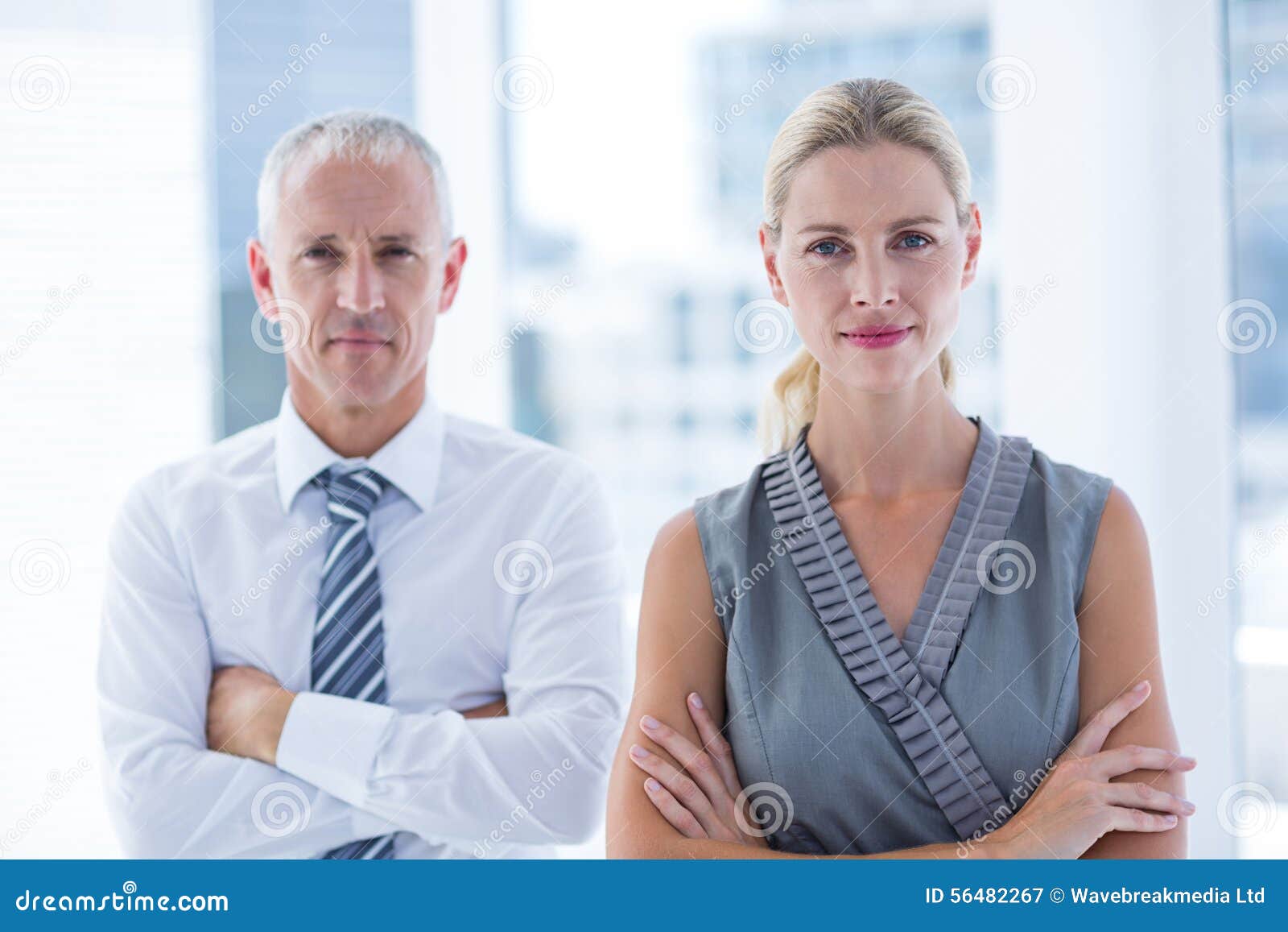 Two Business People Looking at the Camera Stock Image - Image of ...