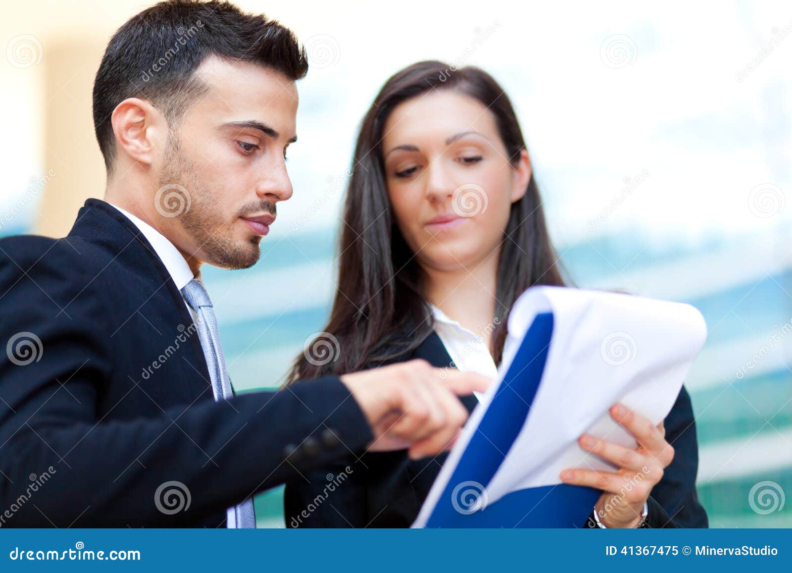 Two Business People Looking Some Documents Stock Image - Image of ...