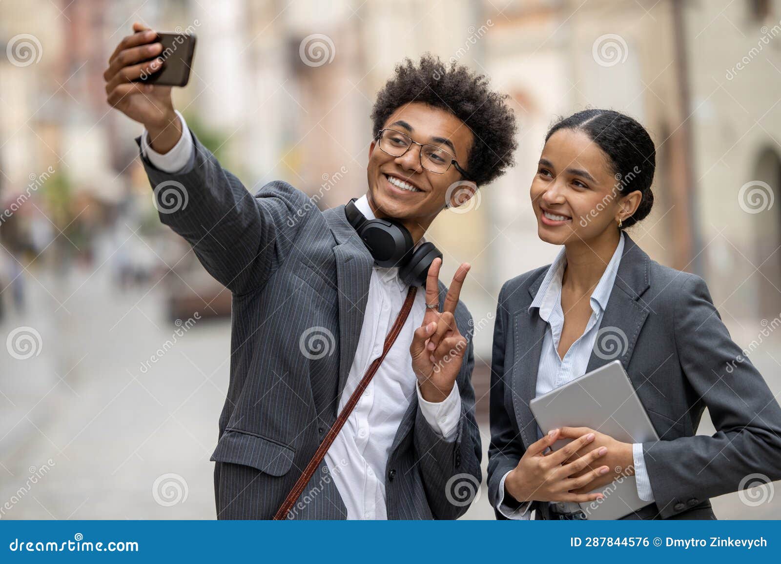 Two Business People Making Selfie Together and Looking Contented Stock ...