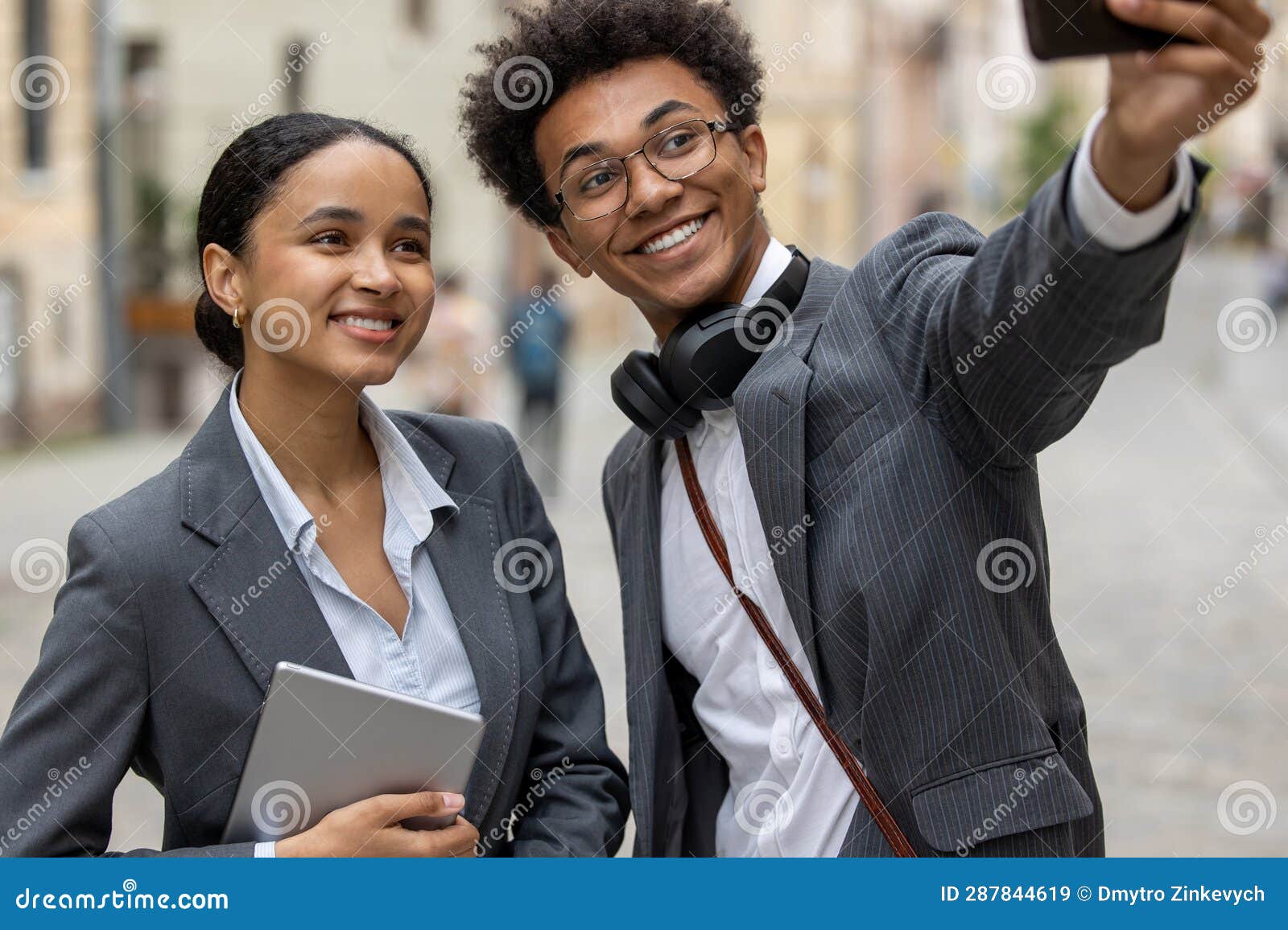 Two Business People Making Selfie Together and Looking Contented Stock ...