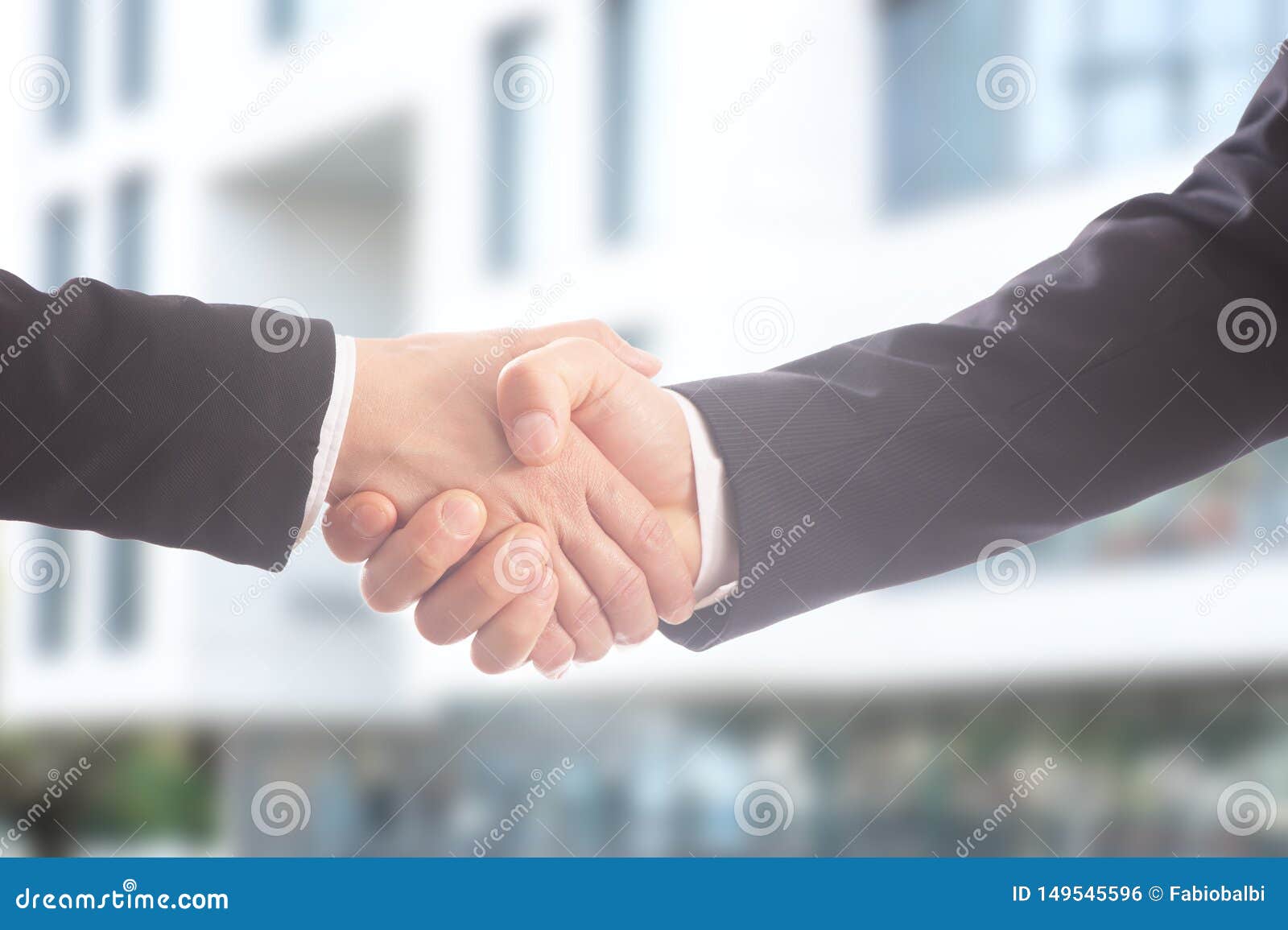 Two Business People Shaking Hands Stock Photo - Image of hand ...