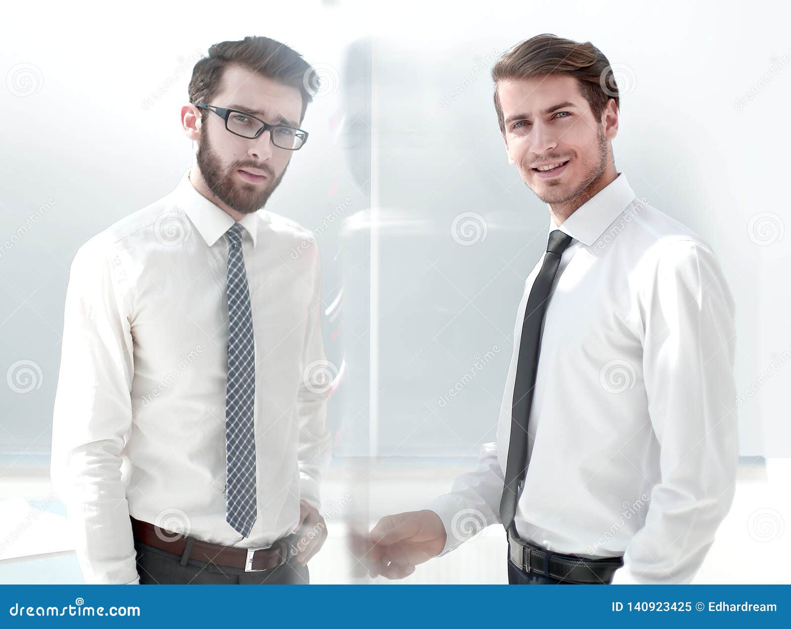 Two Business People Standing in the Office Stock Image - Image of ...