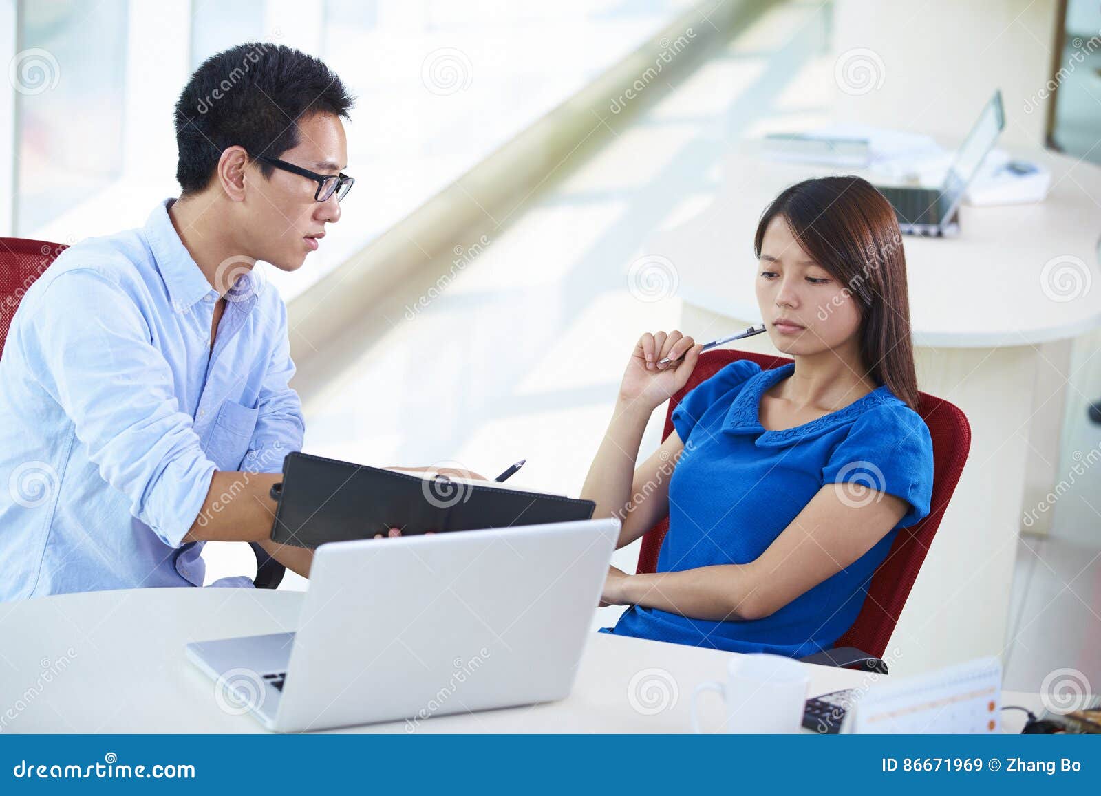 Two Business People Talking in the Office Stock Image - Image of ...