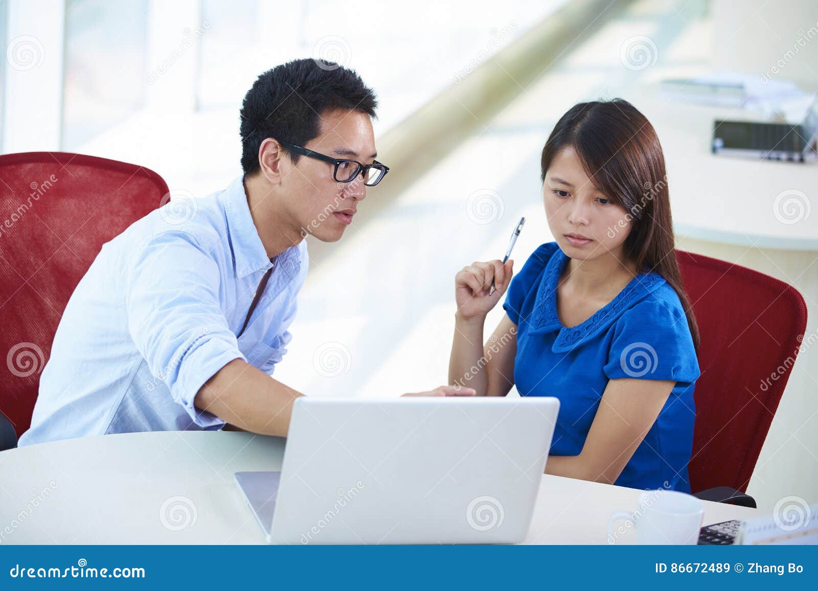 Two Business People Talking in the Office Stock Image - Image of ...