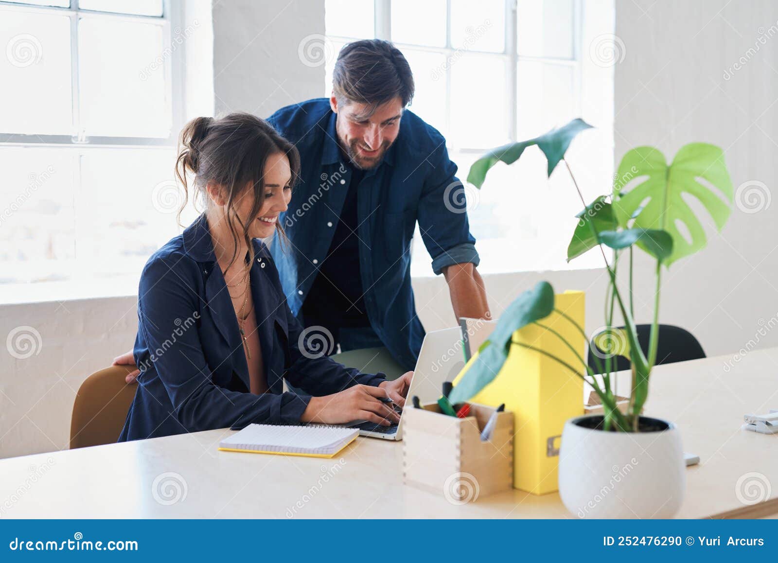 Two Business People Using Laptop Computer Colleagues Working in Office ...