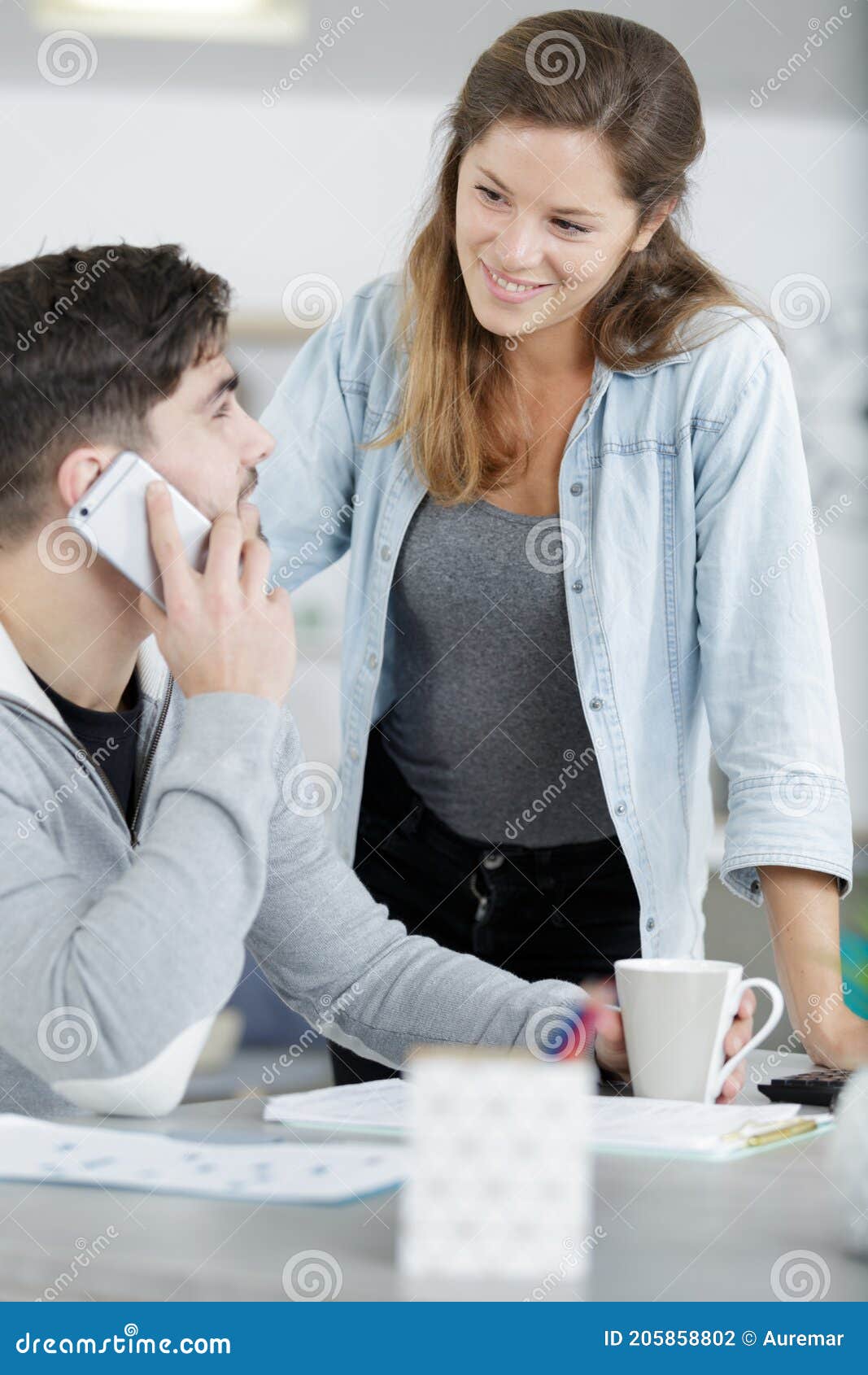 Two Business People Working Together with Documents Stock Photo - Image ...