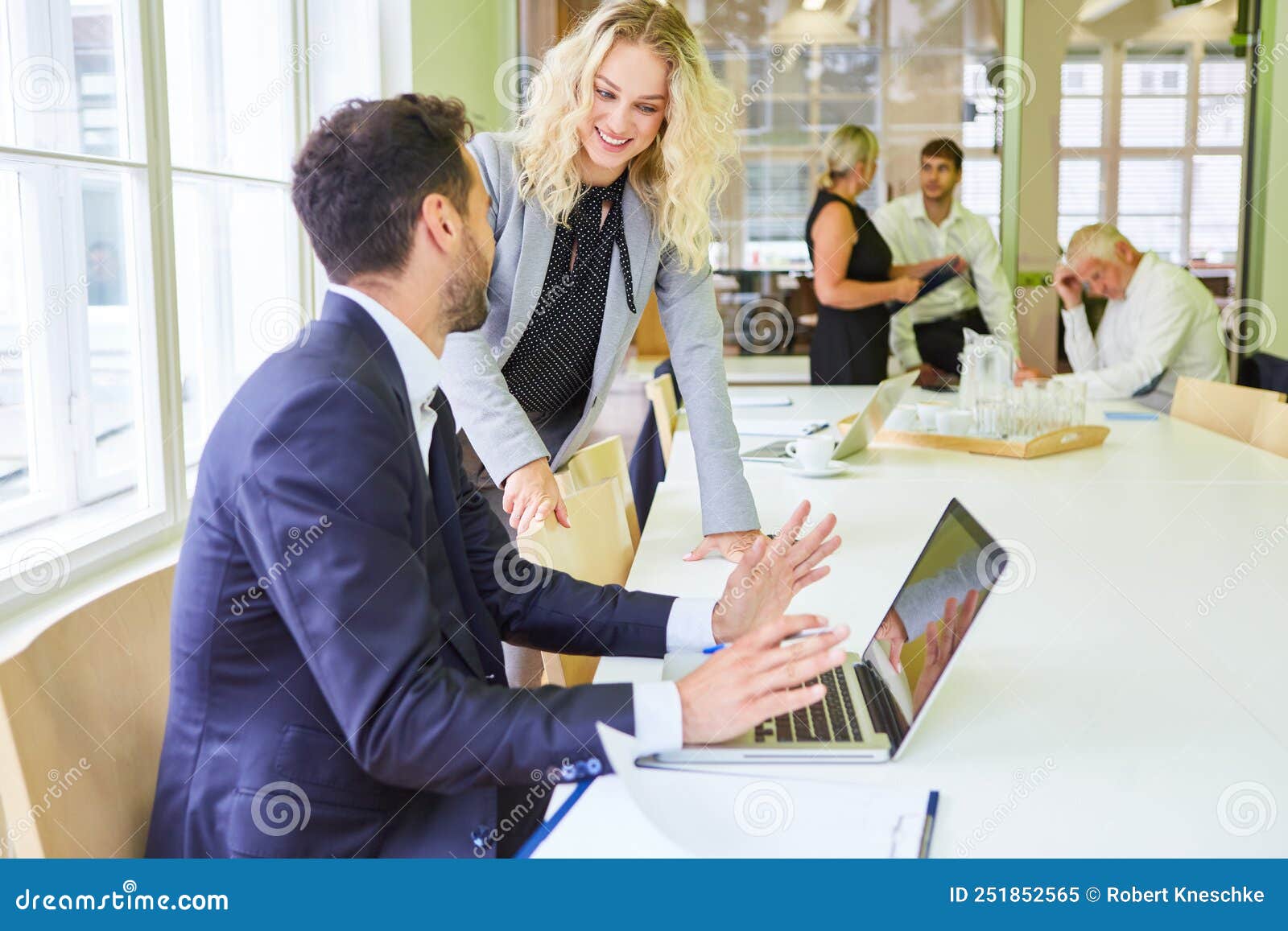 Two Business People are Working Together on the Laptop Stock Image ...