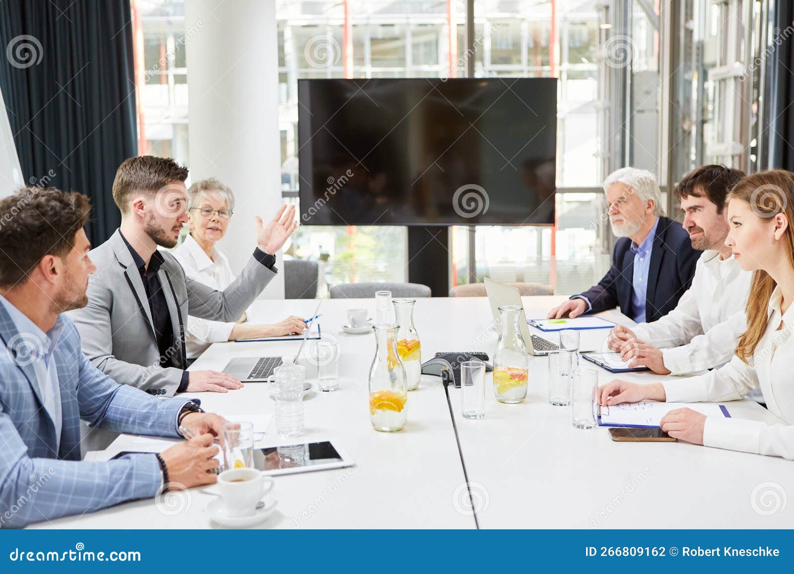 Two Business Teams Discuss Cooperation Stock Photo - Image of ...
