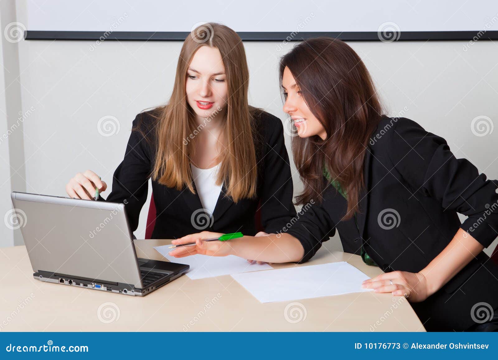Two business women stock image. Image of happy, paper - 10176773