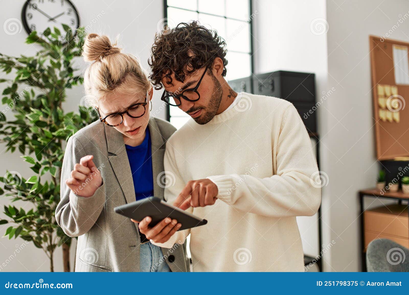 Two Business Workers Concentrated Working Using Laptop at the Office ...