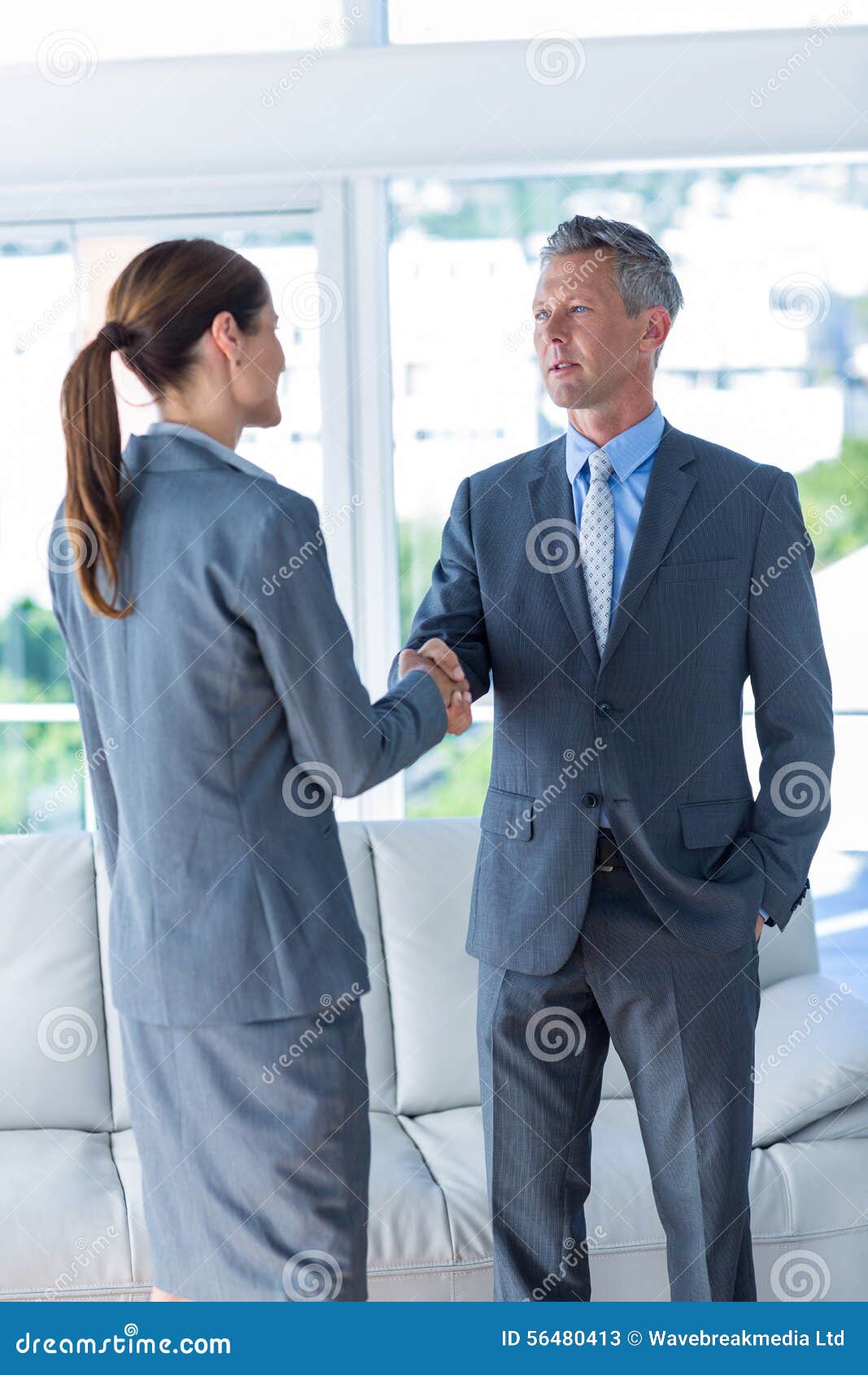 Two Business Workers Shake Hands Stock Image - Image of colleagues ...