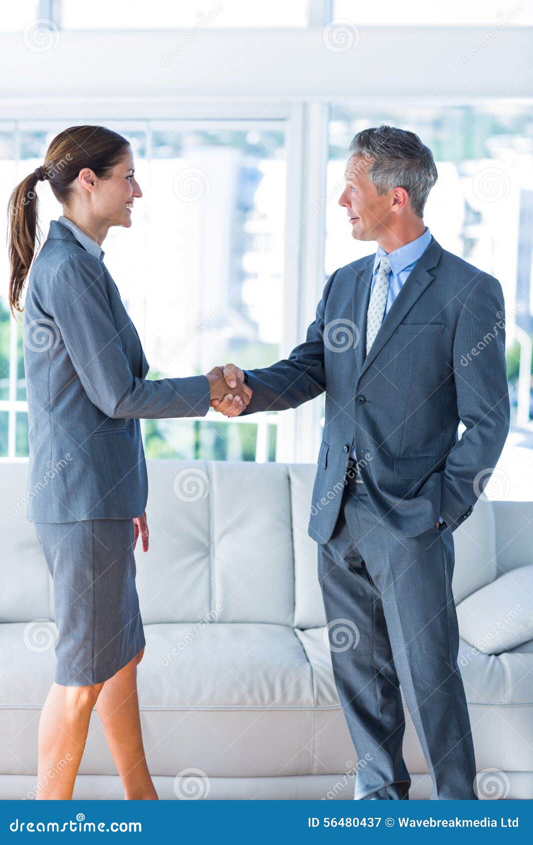 Two Business Workers Shake Hands Stock Image - Image of businessman ...