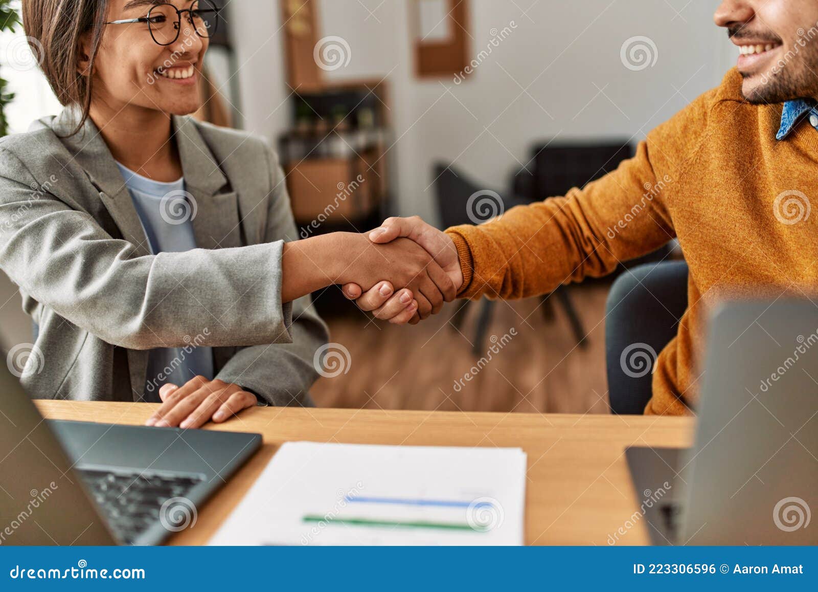 Two Business Workers Shaking Hands at the Office Stock Photo - Image of ...
