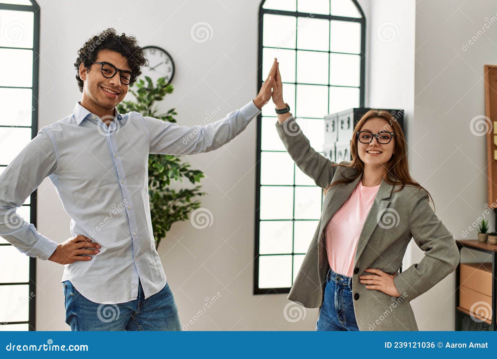Two Business Workers Smiling Happy High Five at the Office Stock Photo ...