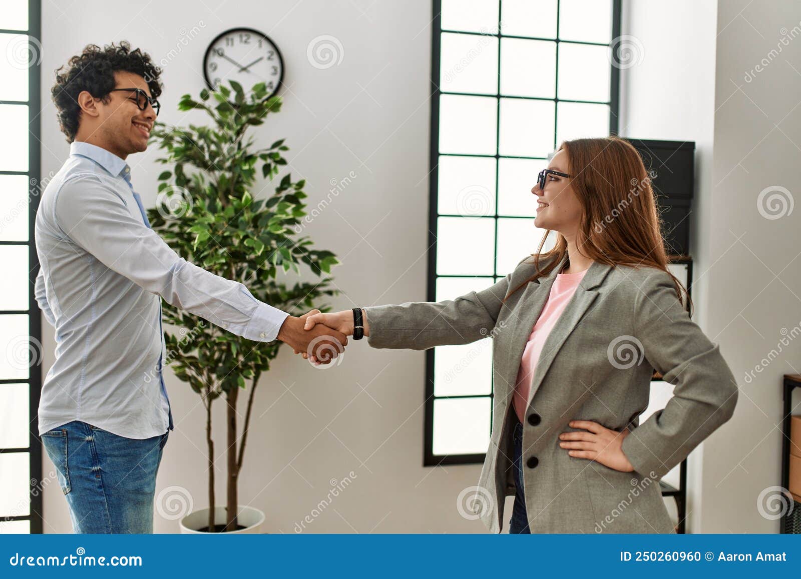 Two Business Workers Smiling Happy Shaking Hands at the Office Stock ...