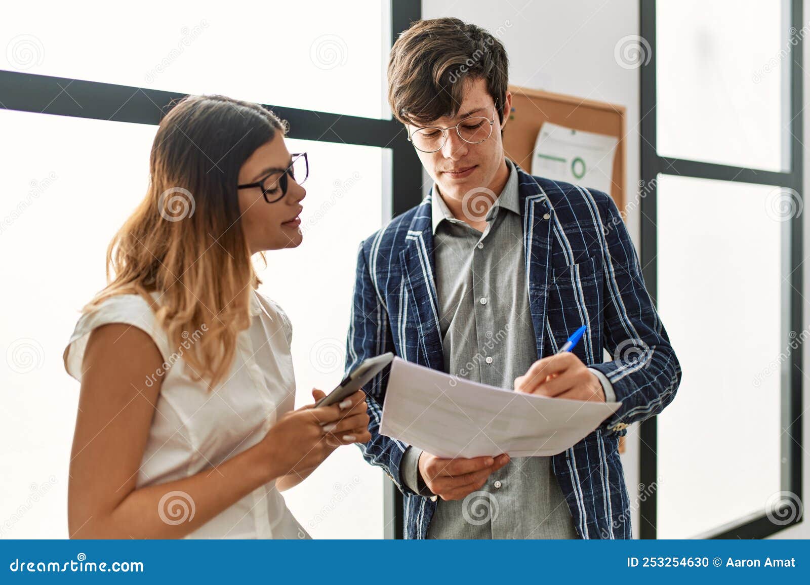 Two Business Workers Smiling Happy Working at the Office Stock Photo ...