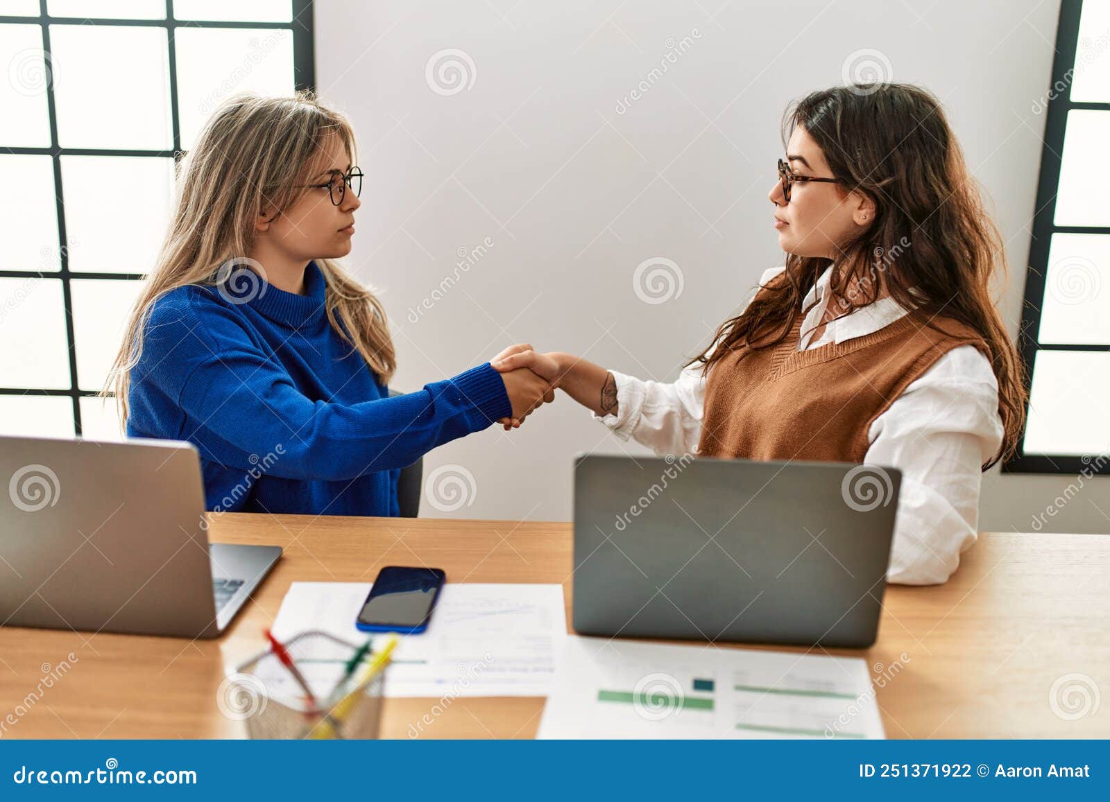 Two Business Workers Woman Shaking Hands at the Office Stock Photo ...