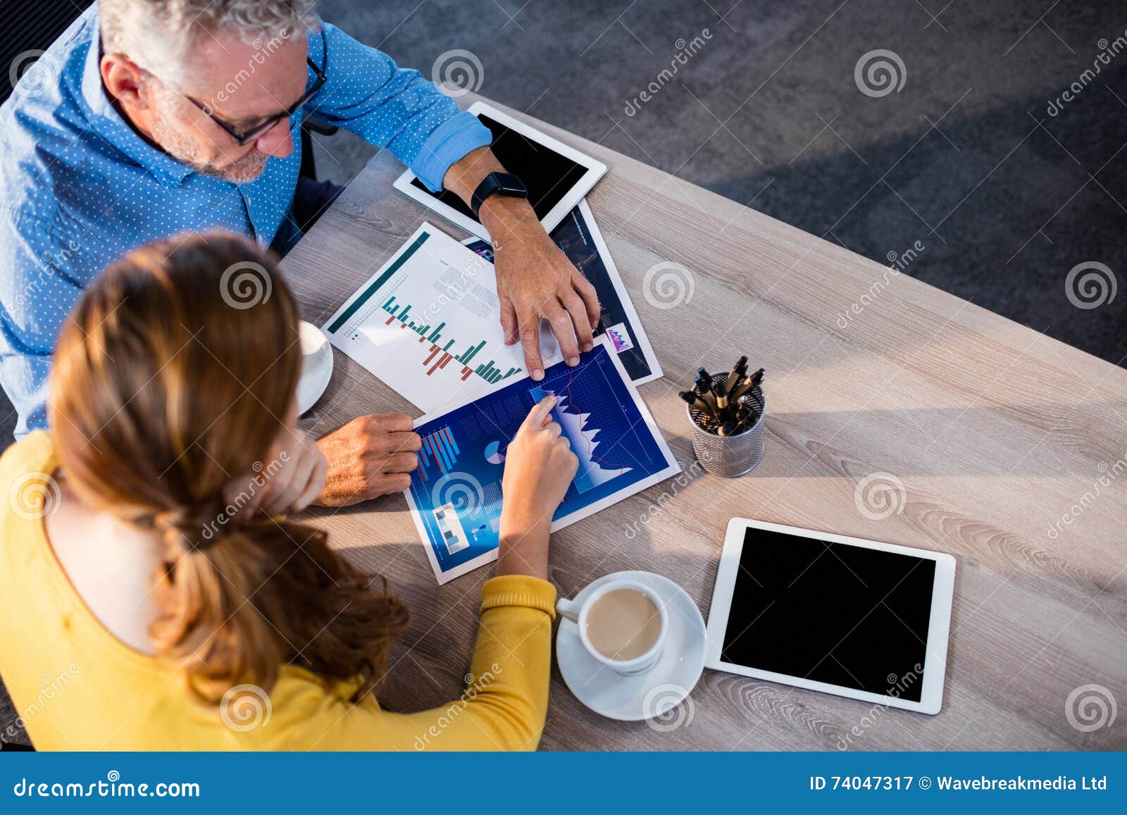 Two Businessmen Analyzing Documents Stock Image - Image of caucasian ...