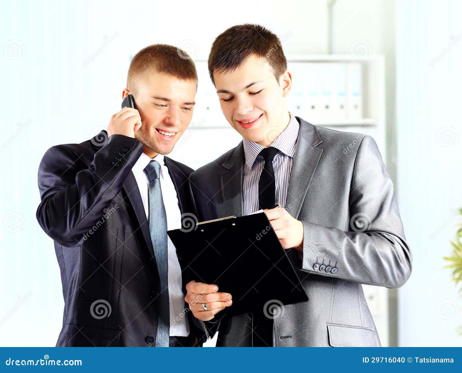 Two businessmen discussing stock photo. Image of people - 29716040