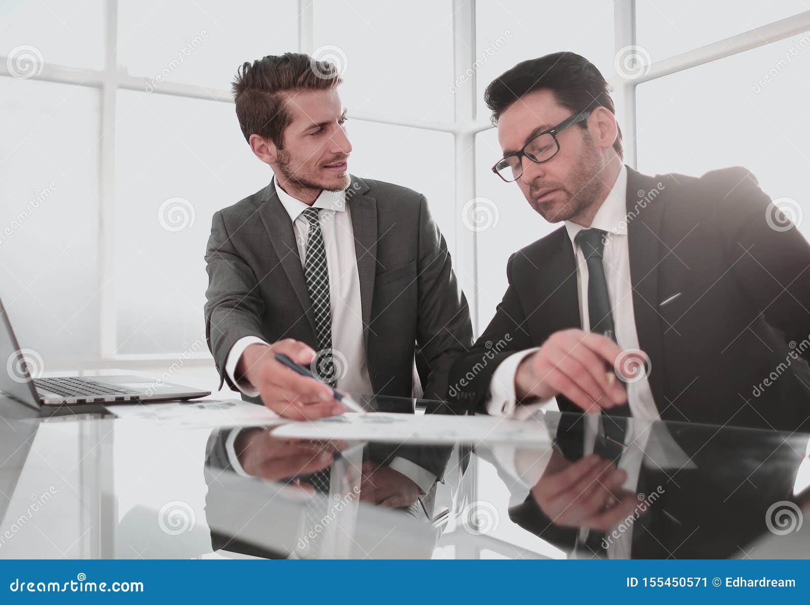 Two Businessmen are Discussing the Terms of the Contract Stock Image ... Two Businessmen are Discussing the Terms of the Contract Stock Image ...