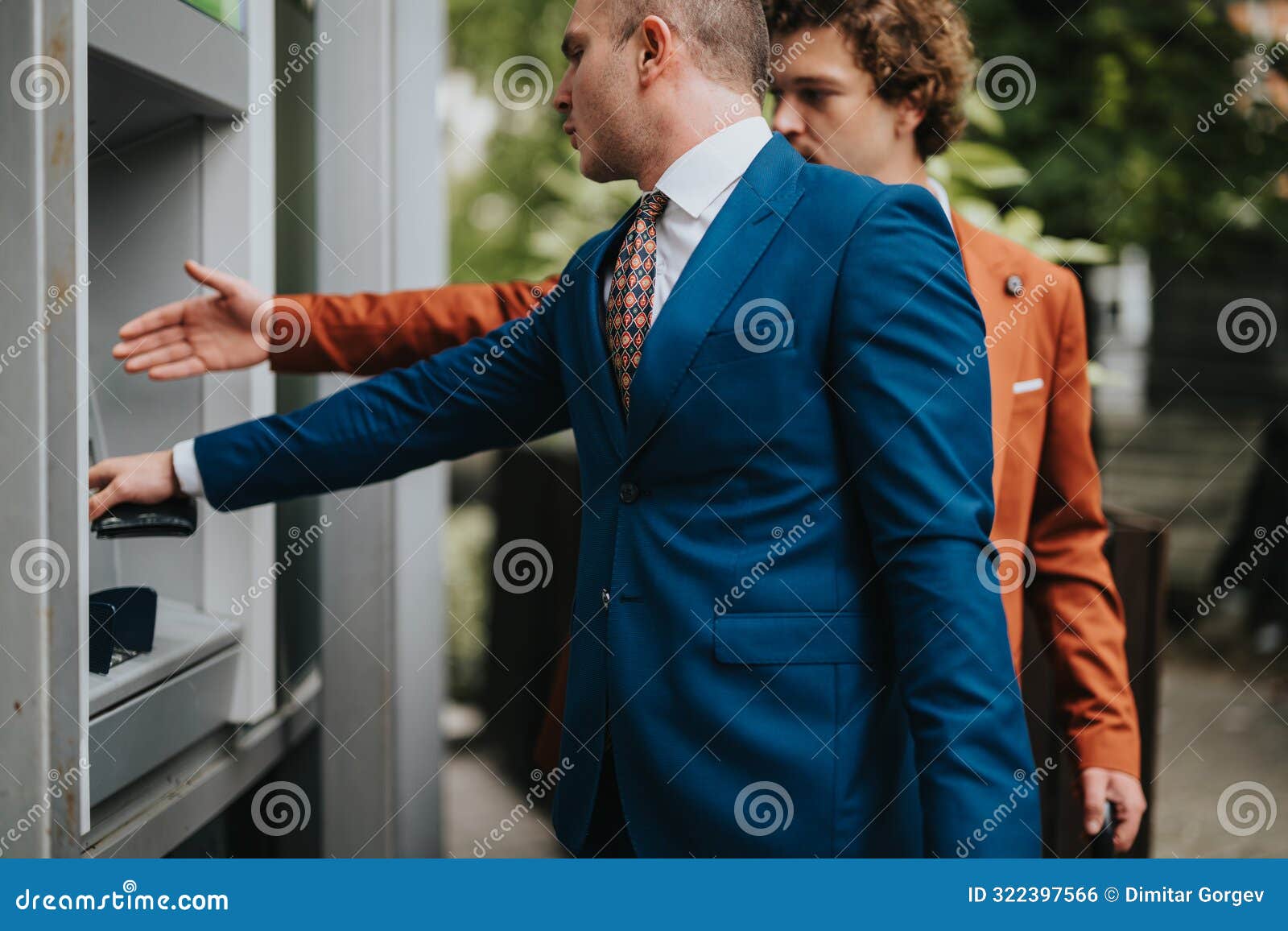 Businessmen Facing an ATM Withdrawal Issue while Using the Machine ...