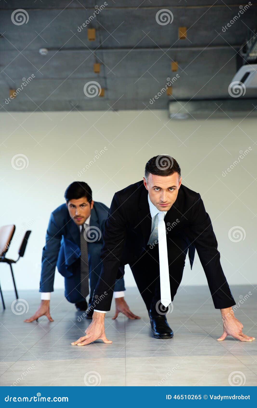Two Businessmen Getting Ready for Corporate Race Stock Image - Image of ...