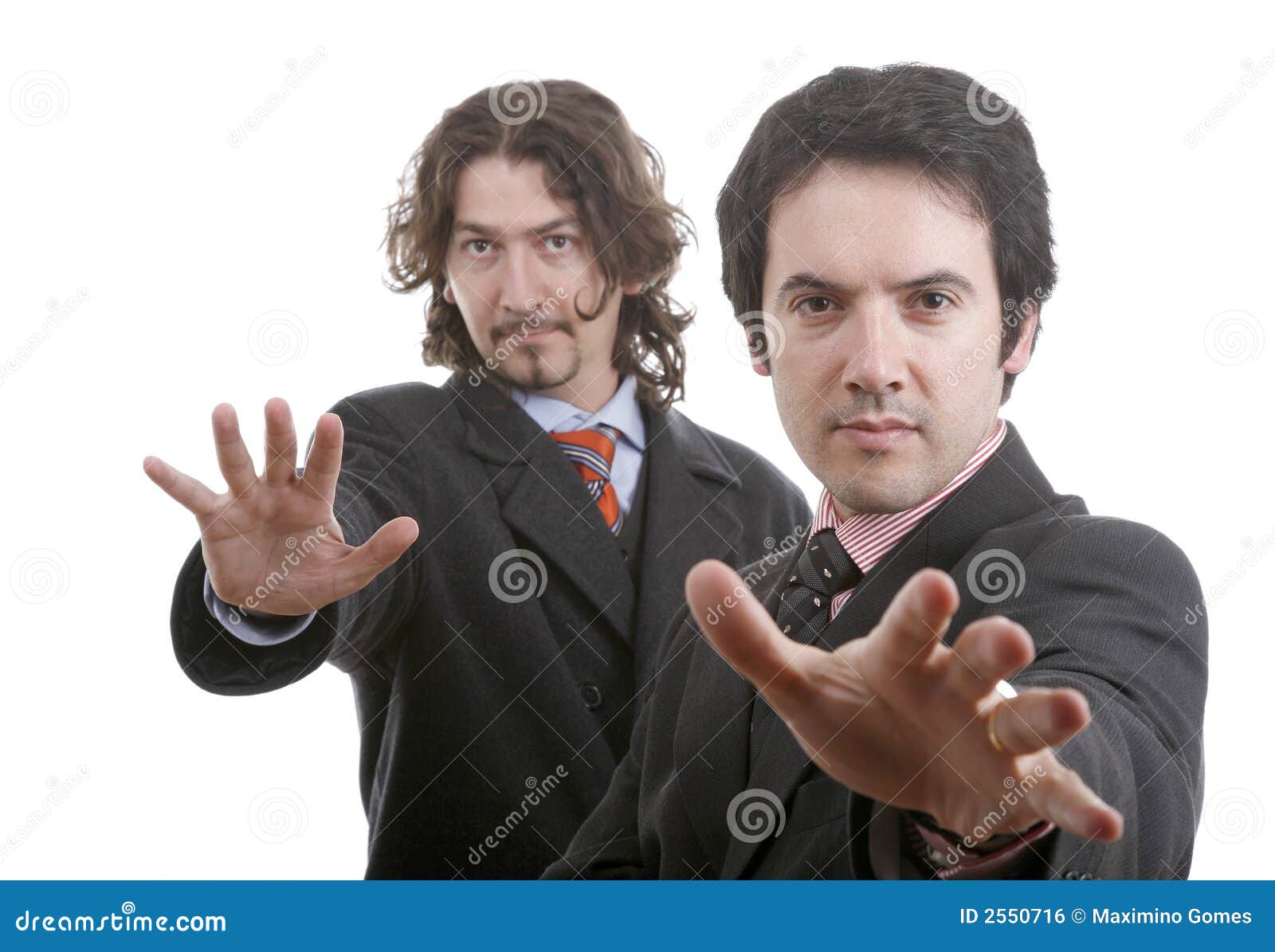 Two businessmen hands out stock photo. Image of outstretched - 2550716
