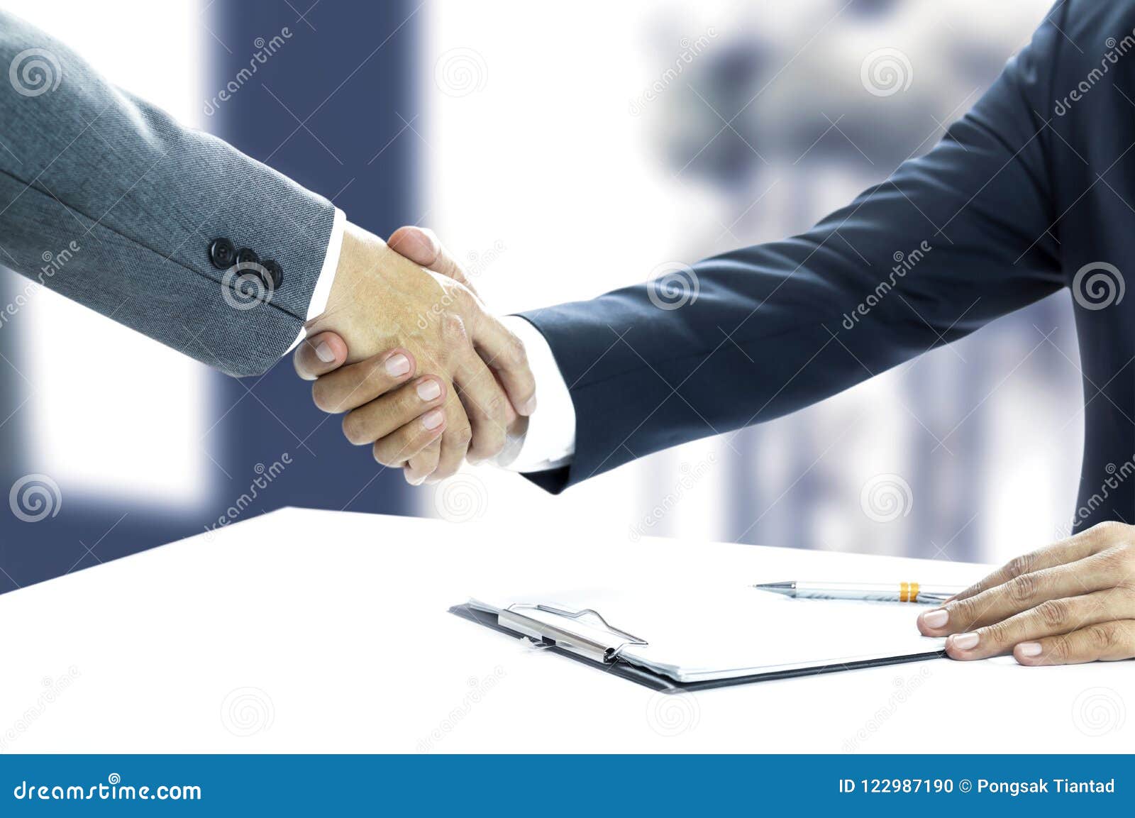 Two Businessmen Handshake after Successful Negotiations. Stock Photo ...