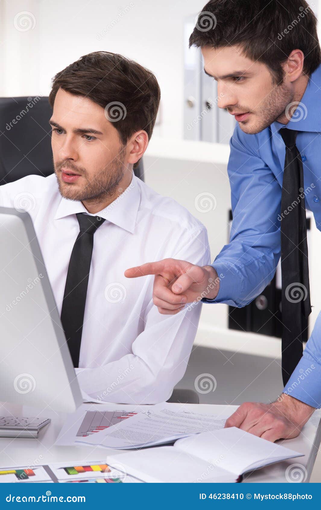 Two Businessmen Having Discussion in Office. Stock Photo - Image of ...