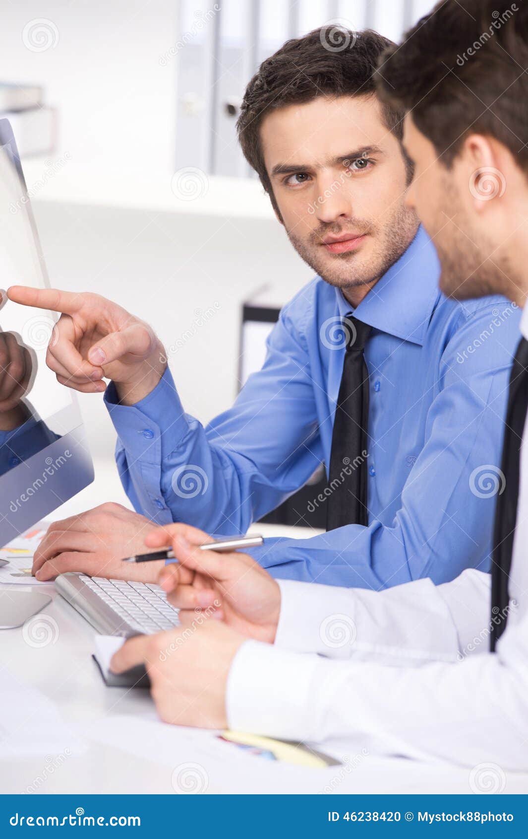 Two Businessmen Having Discussion in Office. Stock Photo - Image of ...