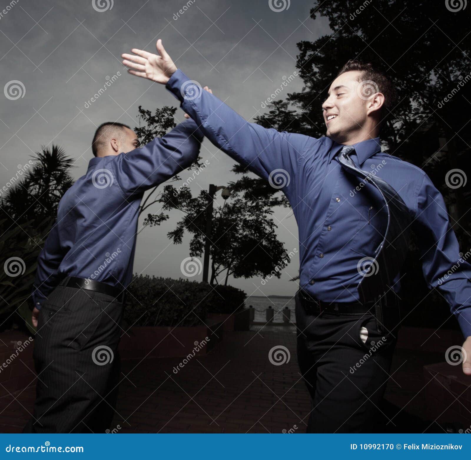 Two Businessmen High Fiving Each Other Stock Photo - Image of ...