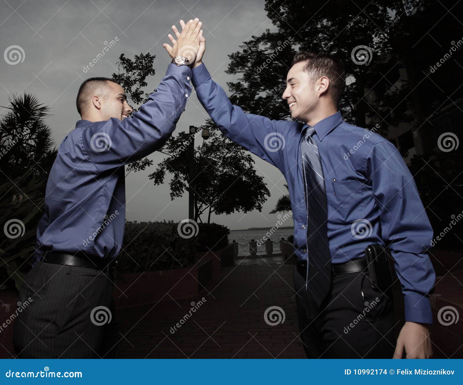 Two Businessmen High Fiving Each Other Stock Photo - Image of slap ...