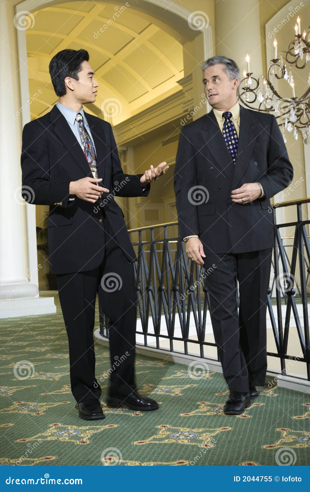 Two businessmen in hotel. stock image. Image of hotel - 2044755