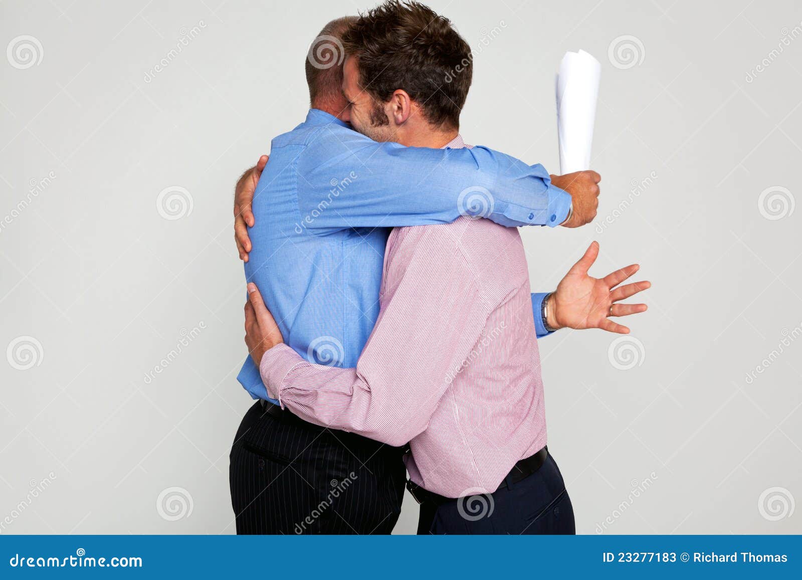 Two businessmen hugging stock image. Image of haapy, businessman - 23277183