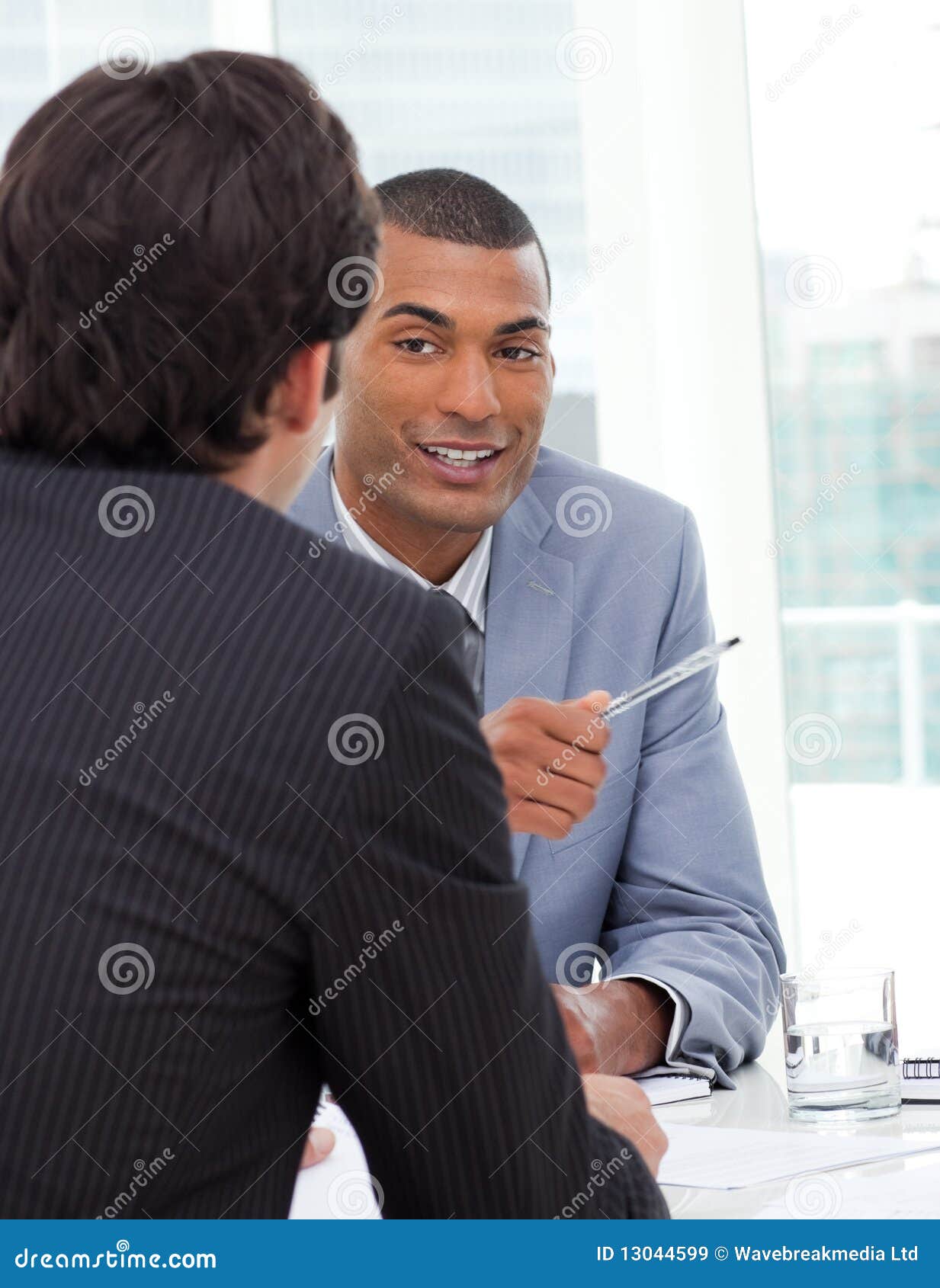 Two Businessmen during a Interview Stock Image - Image of diversity ...