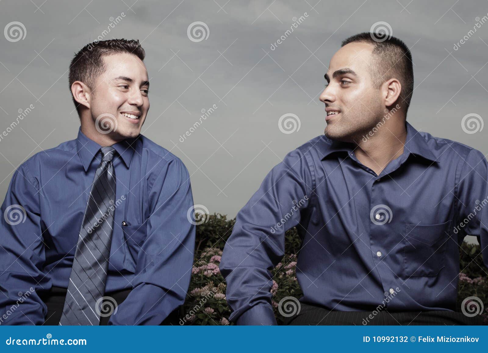 Two Businessmen Looking at Each Other Stock Photo - Image of business ...