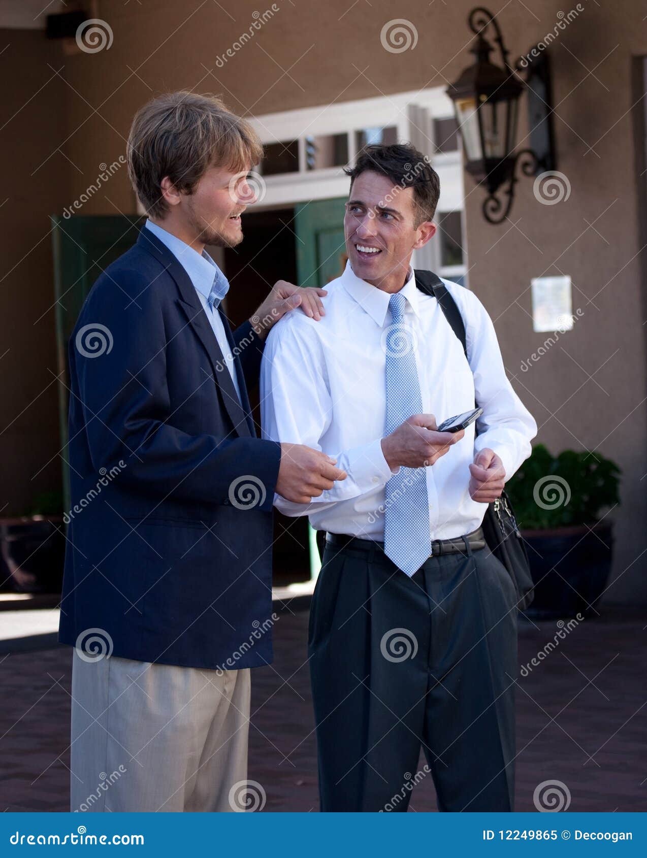 Two Businessmen Looking at Message. Stock Image - Image of talking ...