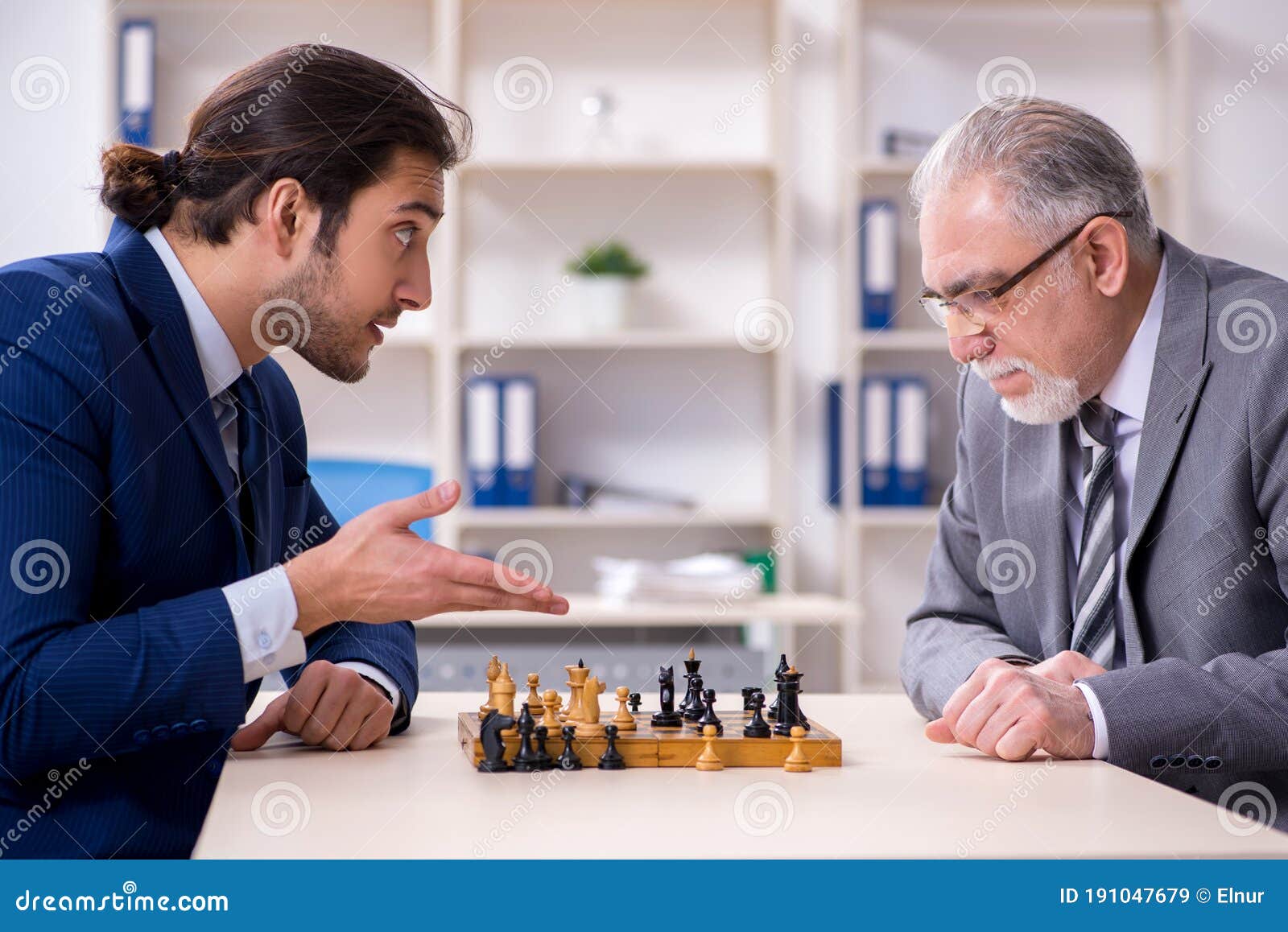 Two Businessmen Playing Chess in the Office Stock Image - Image of ...
