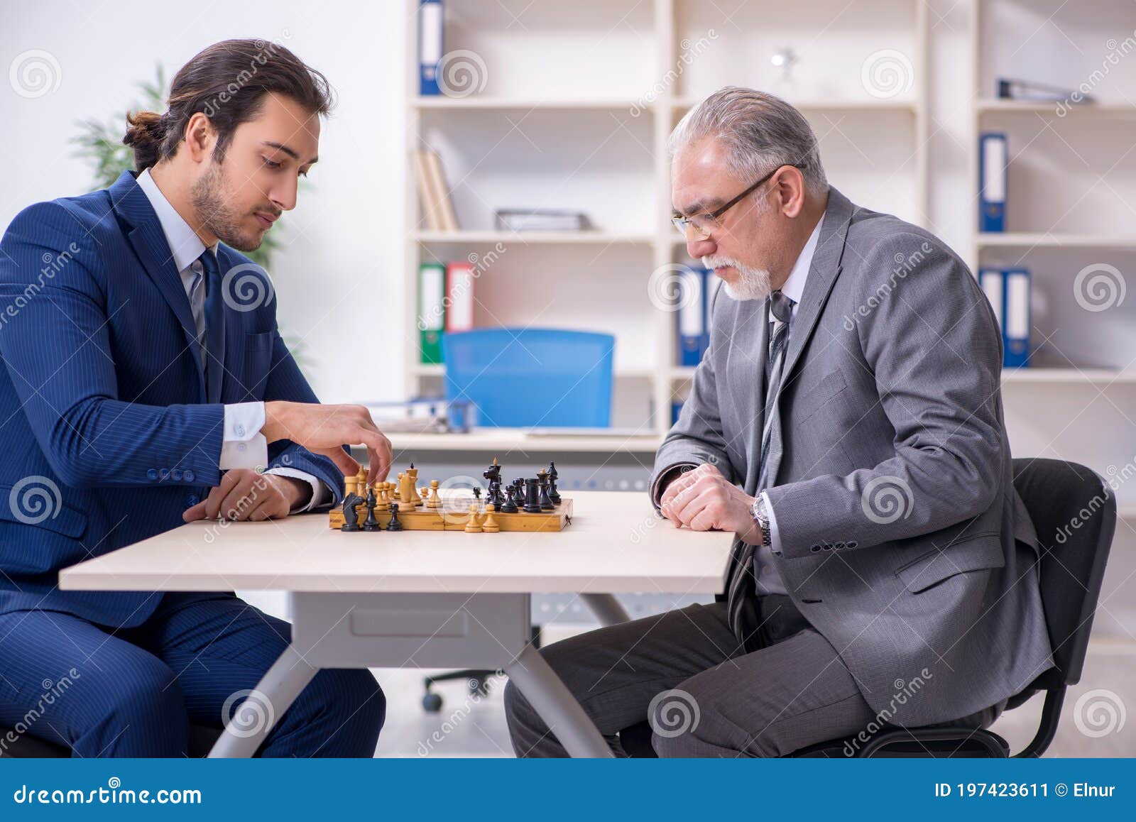 Two Businessmen Playing Chess in the Office Stock Image - Image of ...
