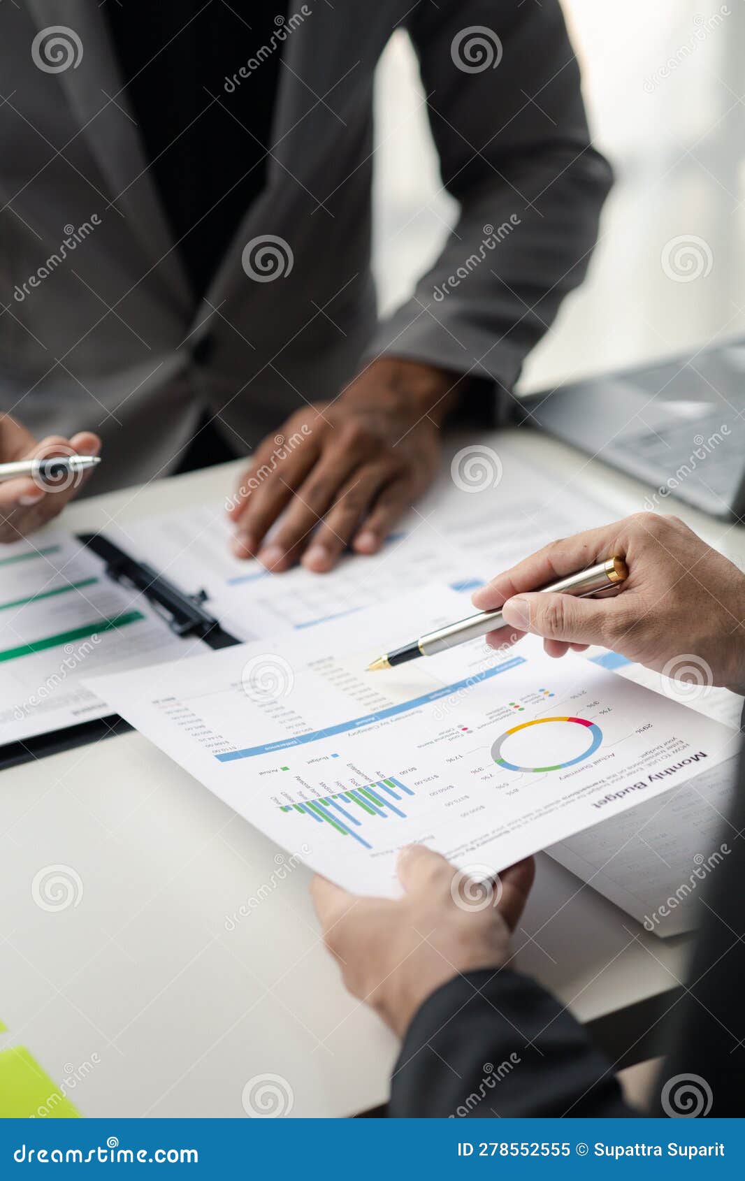 Two Businessmen Pointed To the Material for the Meeting, Working ...
