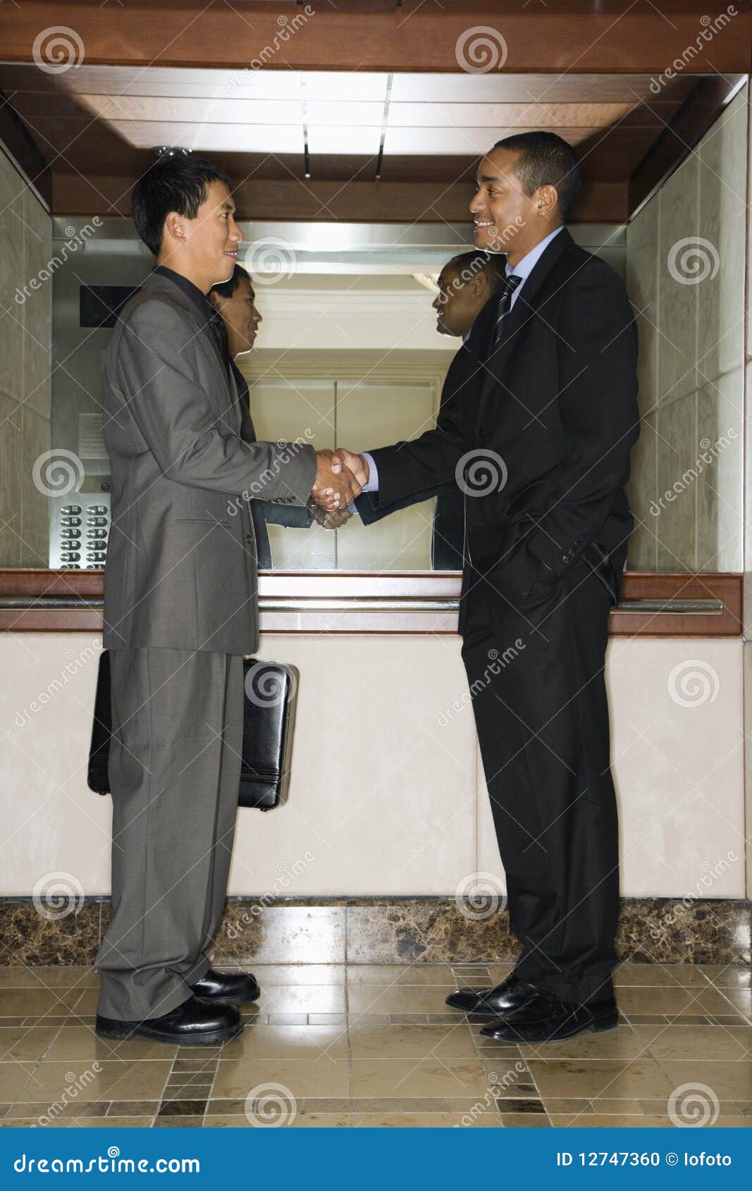 Two Businessmen Shaking Hands Stock Photo - Image of executive ...