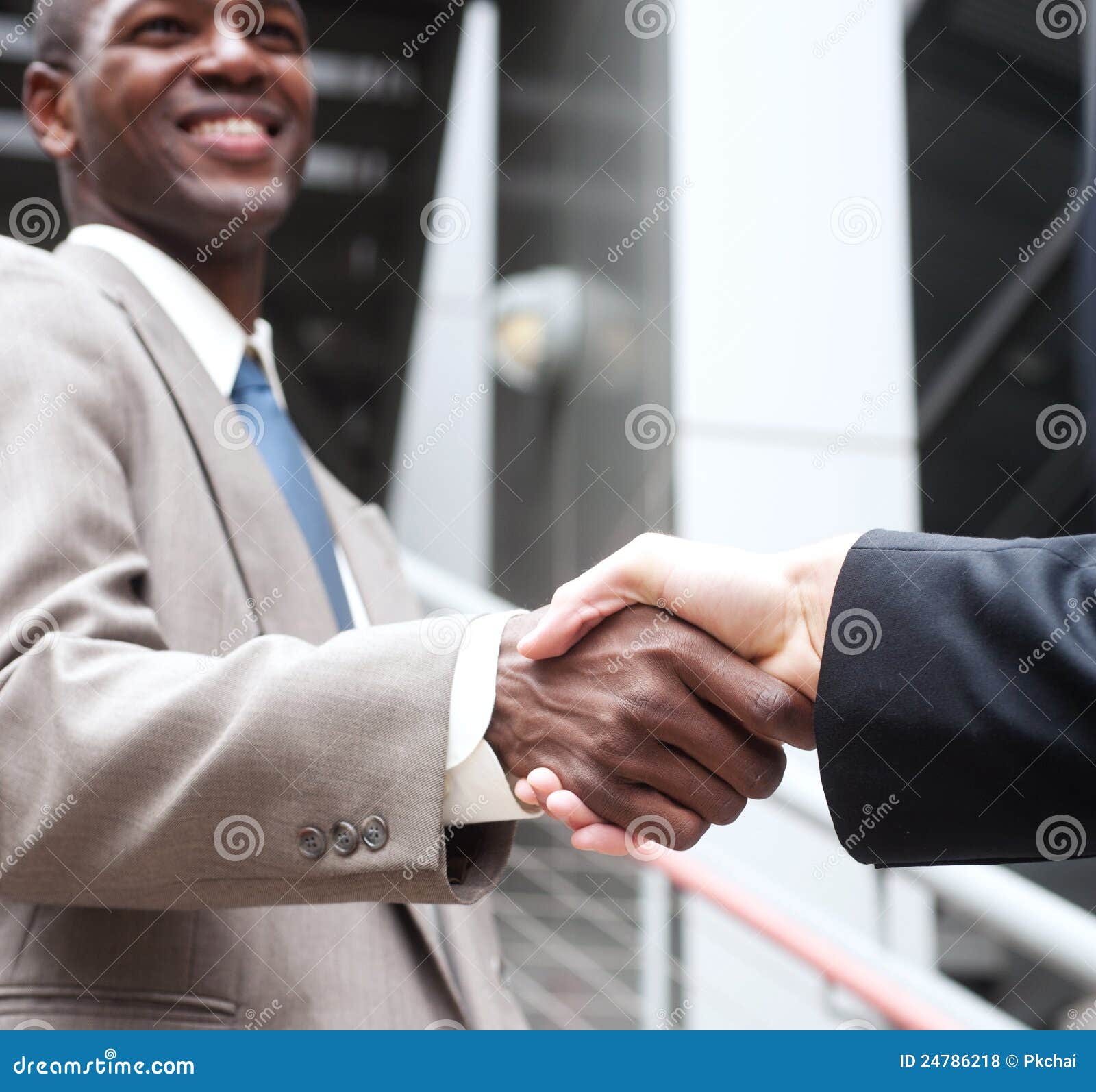 Two Businessmen Shaking Hands Stock Photo - Image of occupation, ethnic ...