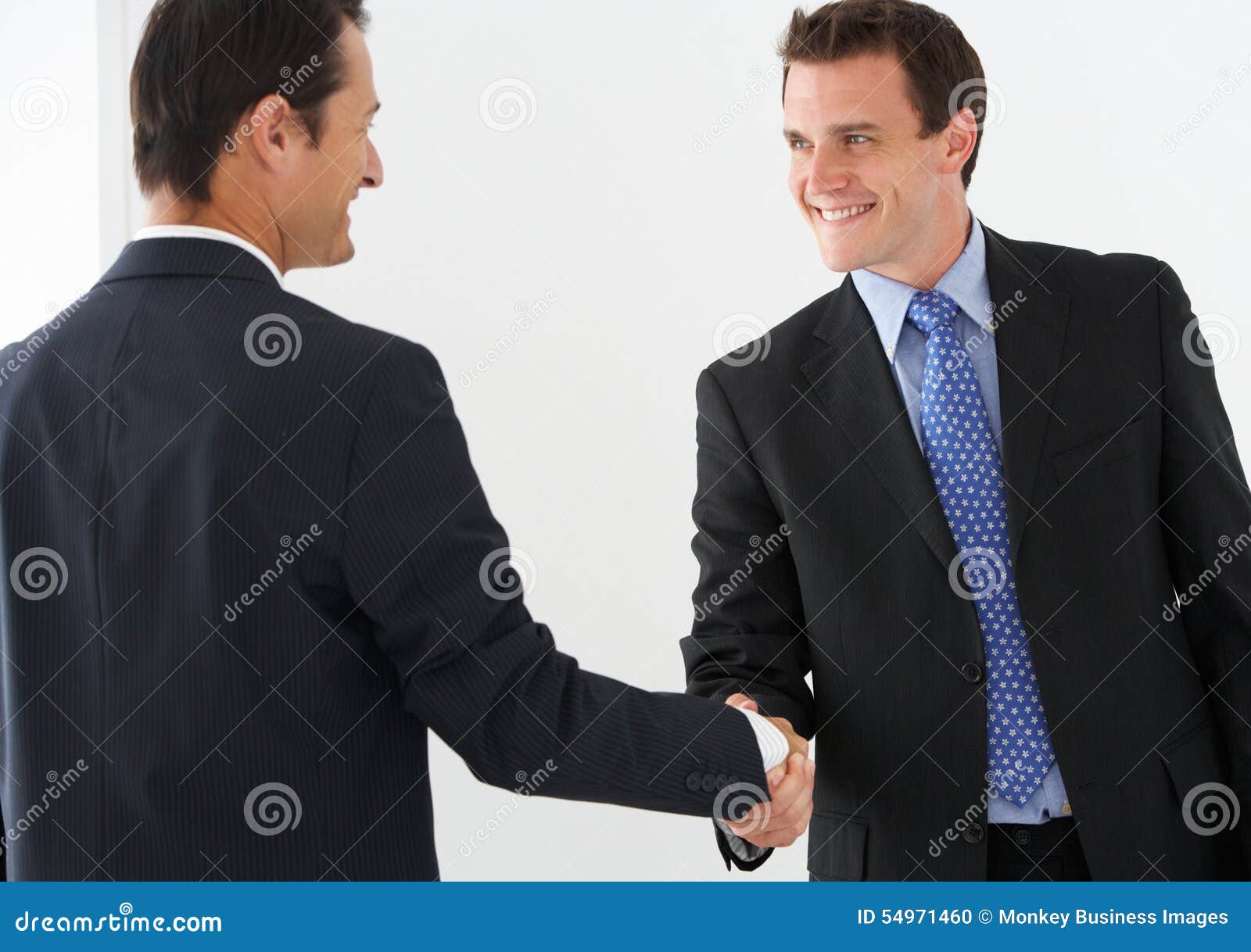 Two Businessmen Shaking Hands Stock Photo - Image of occupation, shirt ...