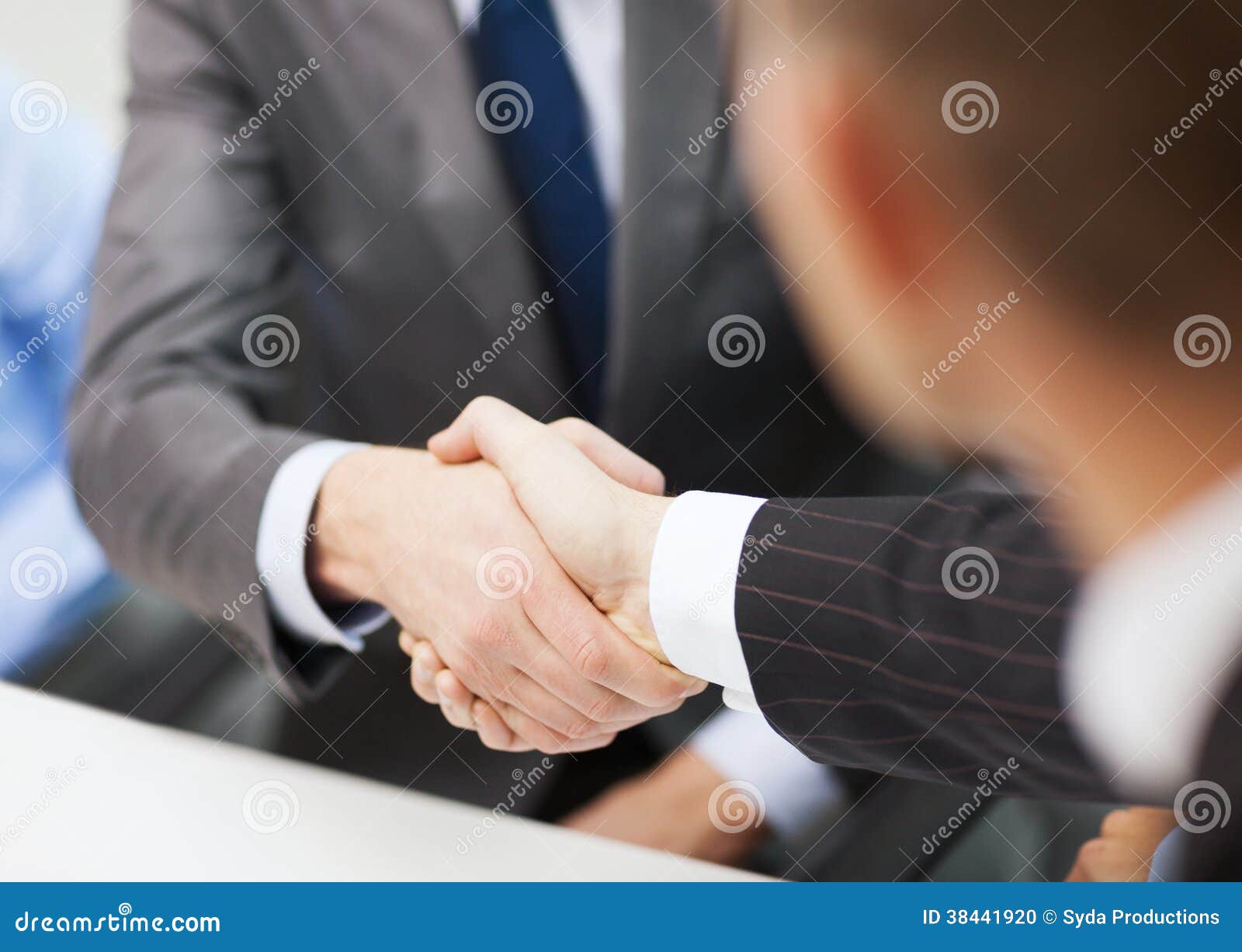 Two Businessmen Shaking Hands in Office Stock Photo - Image of ...