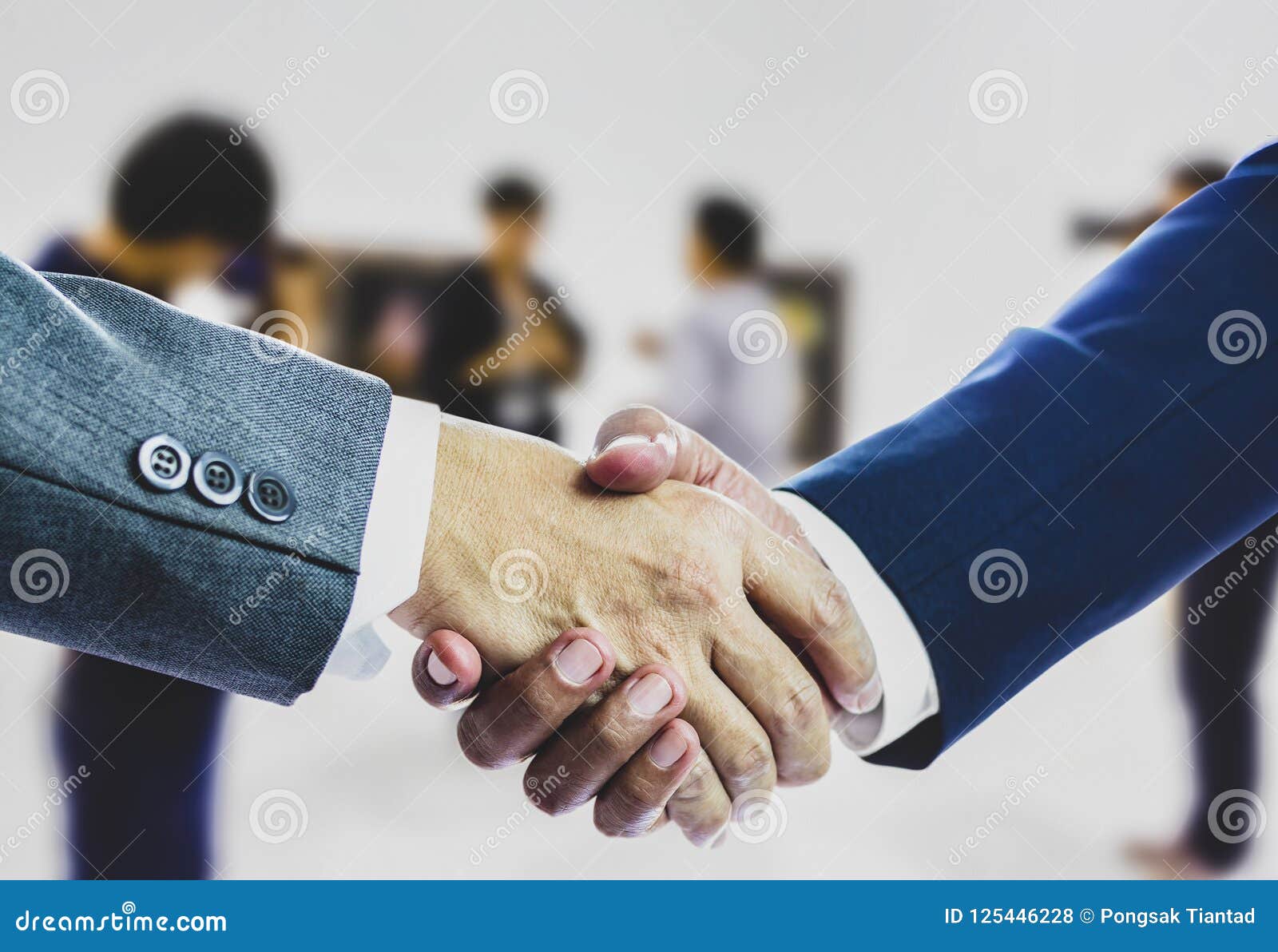Two Businessmen Shaking Hands after Successful Negotiations. Stock ...
