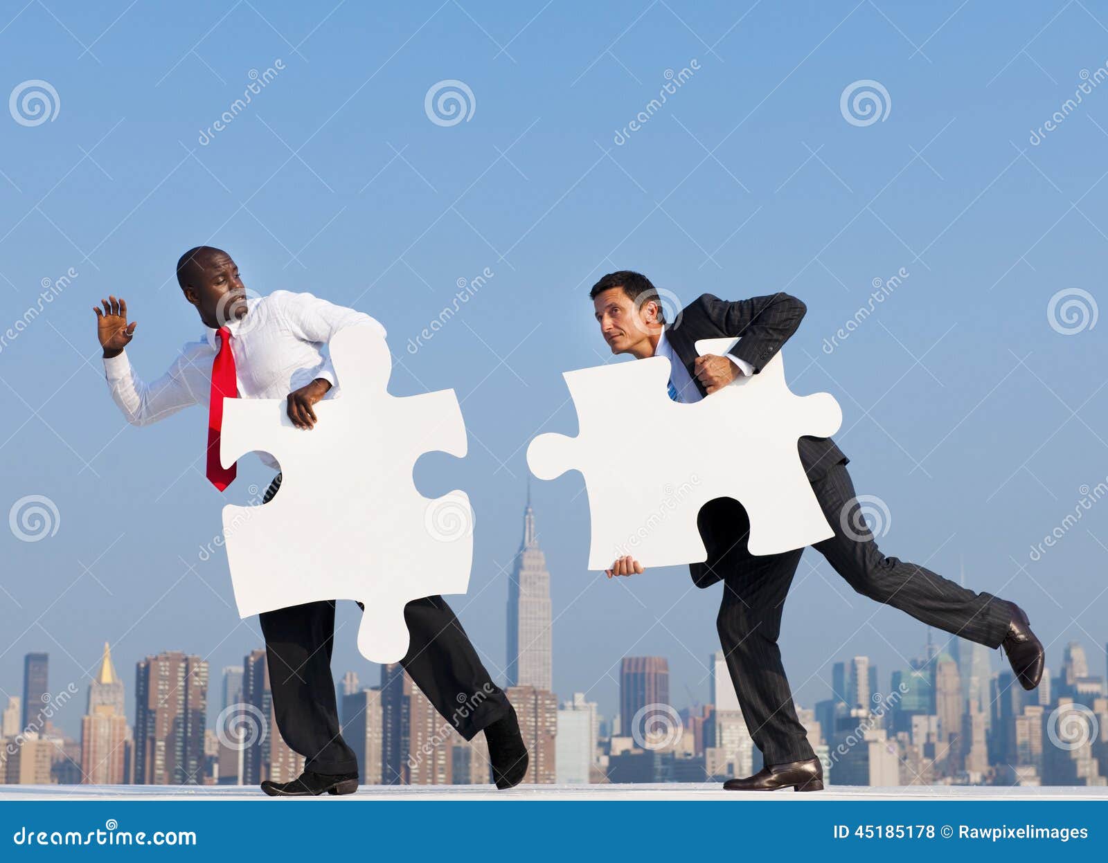 Two Businessmen Solving a Puzzle Stock Photo - Image of problems ...