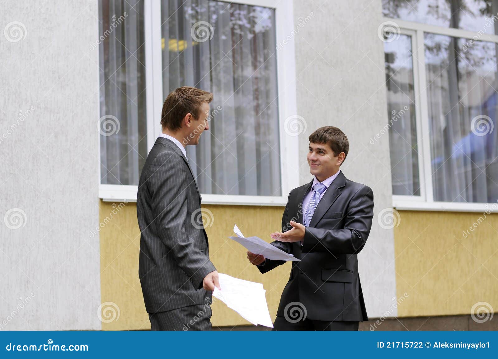 Two businessmen talking stock photo. Image of perspective - 21715722