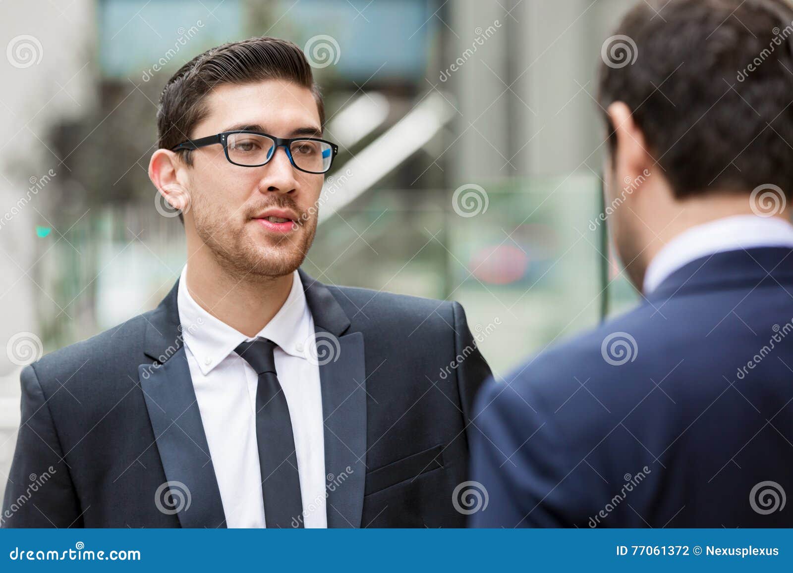 Two Businessmen Talking Outdoors Stock Photo - Image of businessmen ...