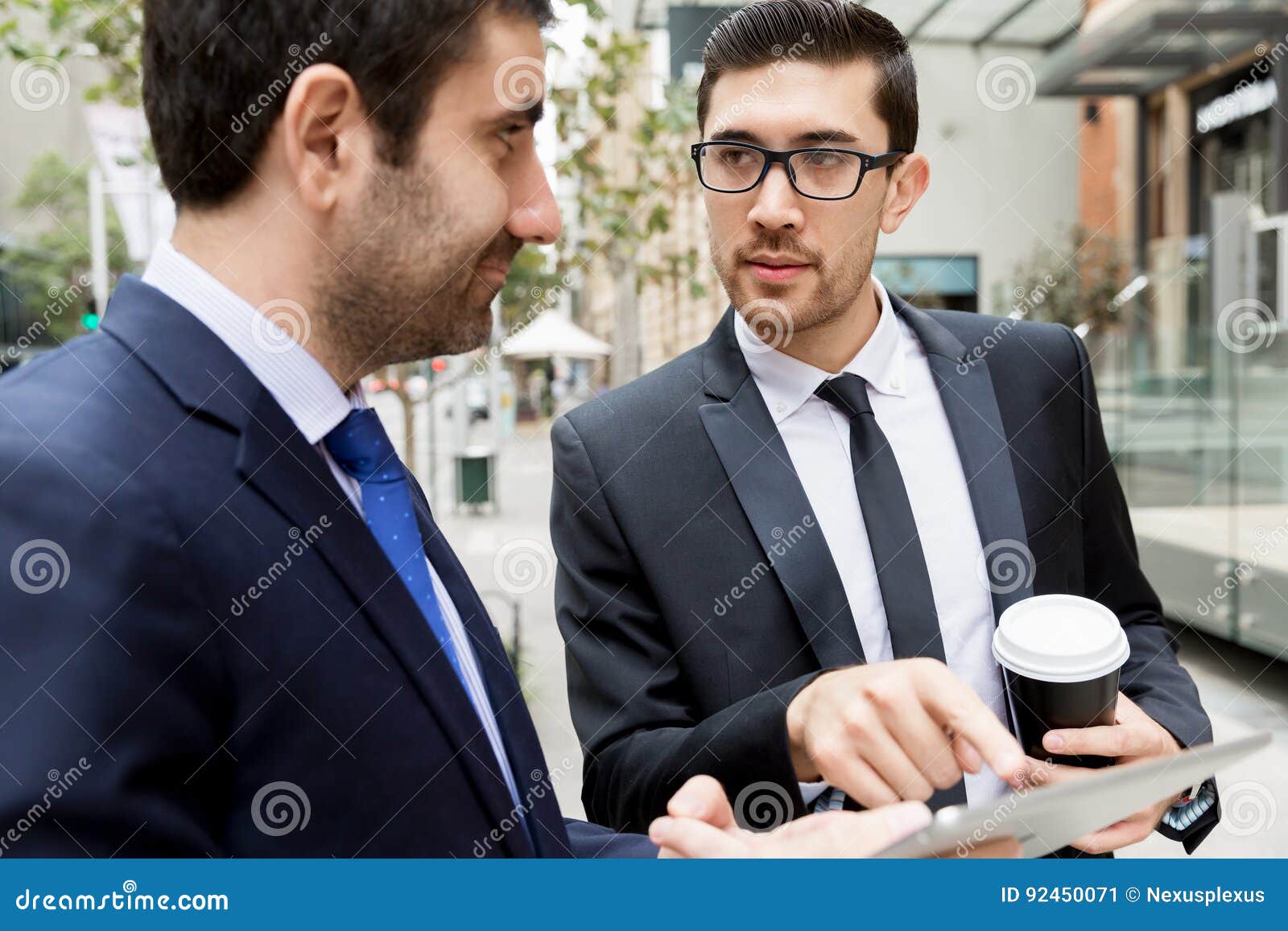 Two Businessmen Talking Outdoors Stock Image - Image of colleagues ...