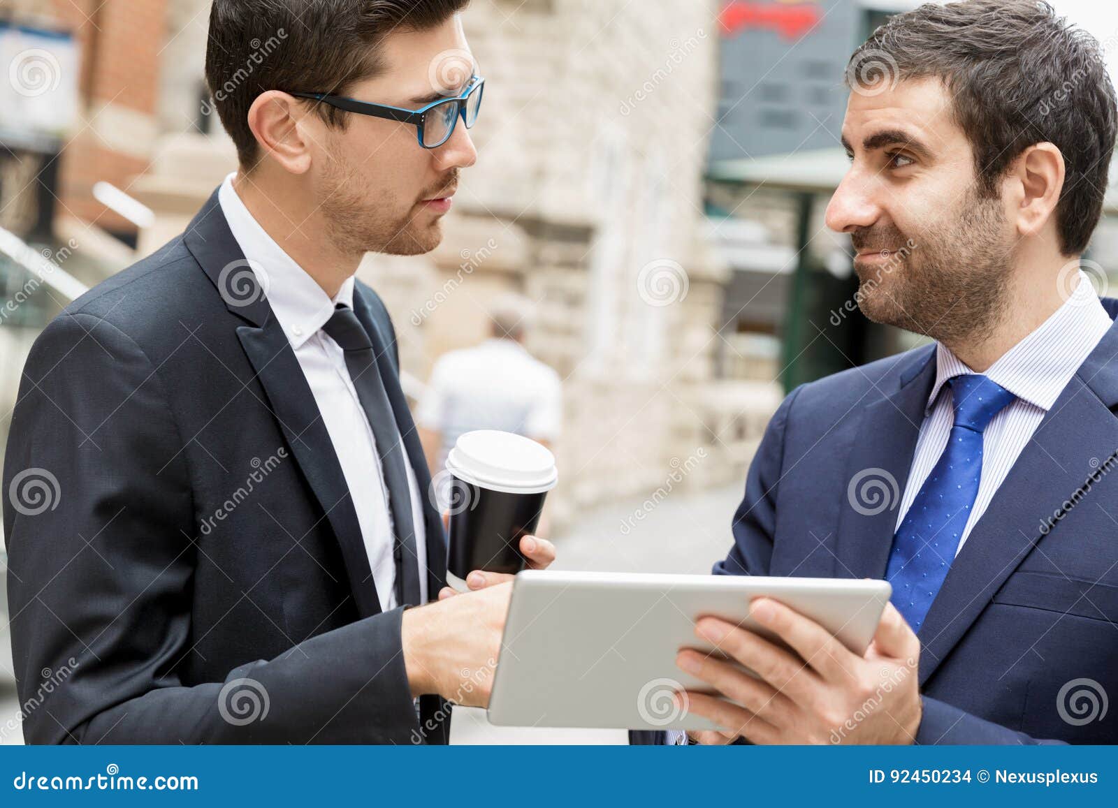Two Businessmen Talking Outdoors Stock Photo - Image of professional ...